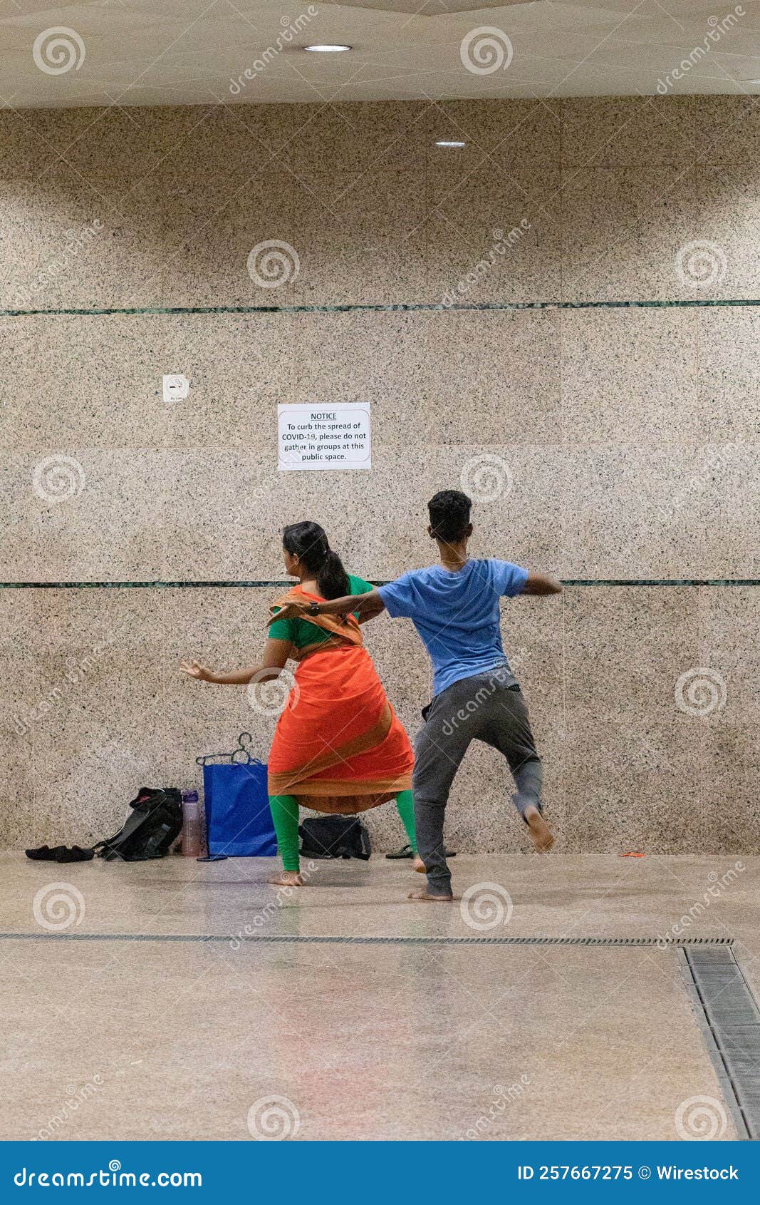 Vertical Rear View of a Couple Practicing Dance on Esplanade Underpass ...