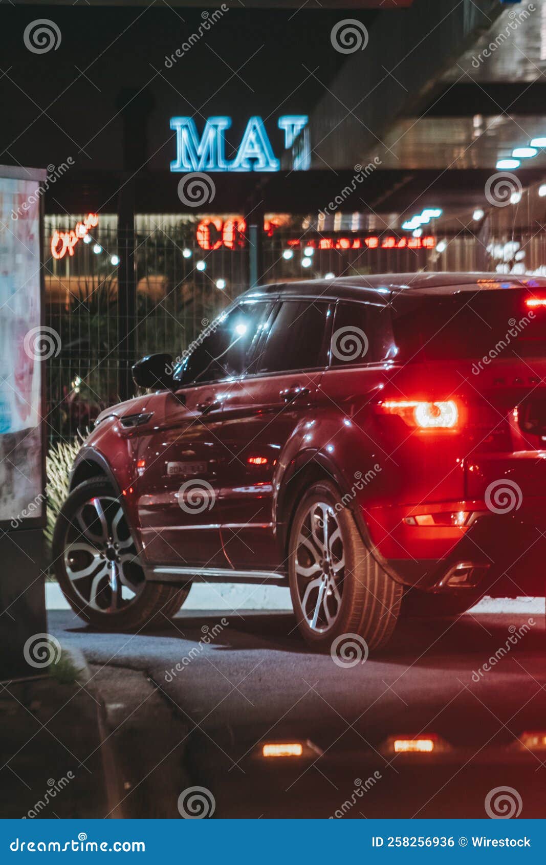 Vertical of a Red Range Rover at the Night City Editorial Photo - Image ...