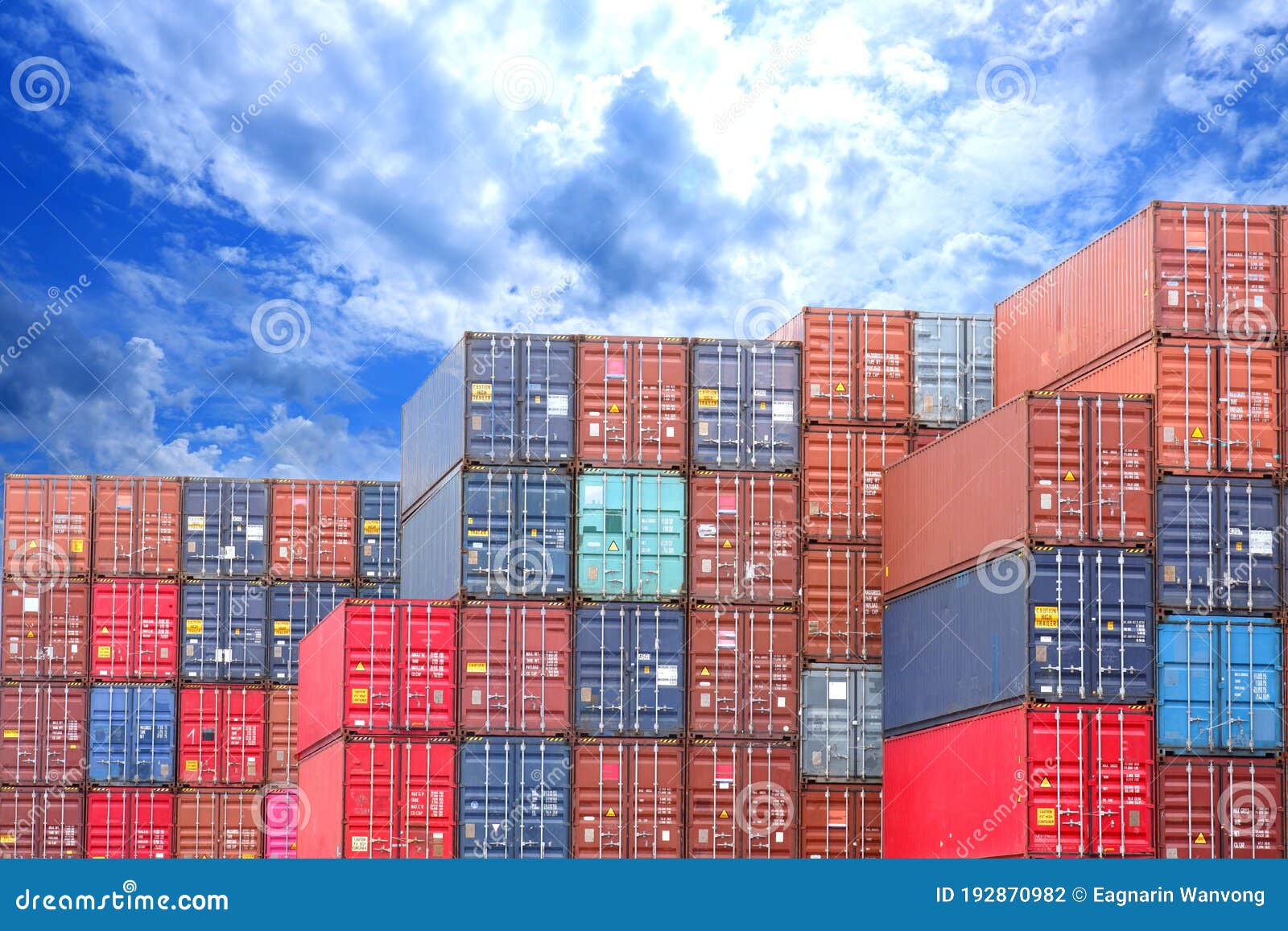 Vertical Row of Four Container Containers of Different Colors in the ...