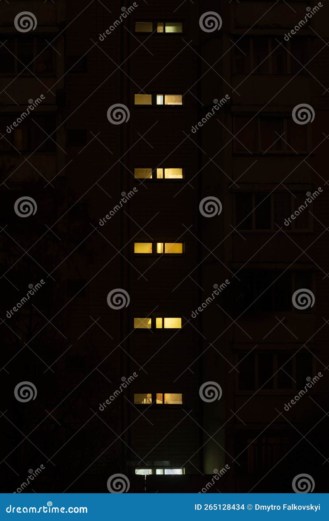 A Vertical Row of Narrow Rectangular Windows of a High-rise Residential ...