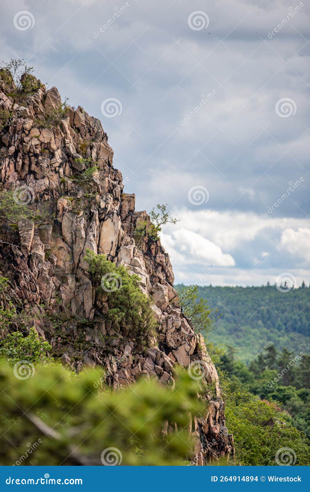 Vertical of a Rugged Cliff, Cascade of Rock Formations Captured Against ...