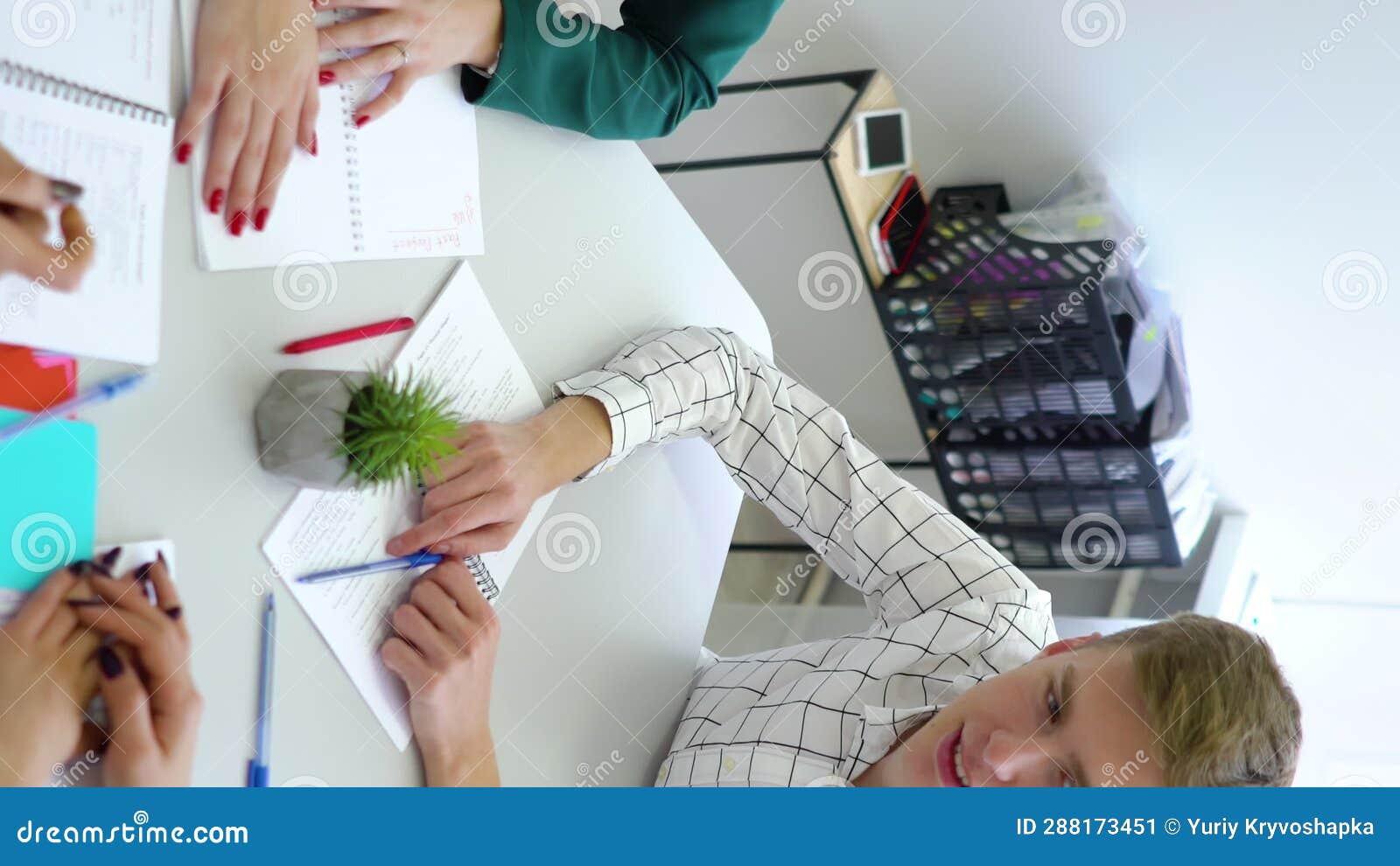 Vertical Screen: College Students Having Teamwork Practice at Table ...