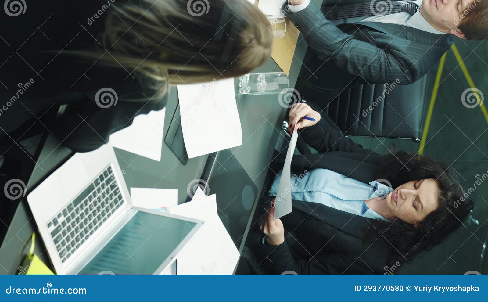 Vertical Screen: Group of Managers Discussing Progress at Business ...