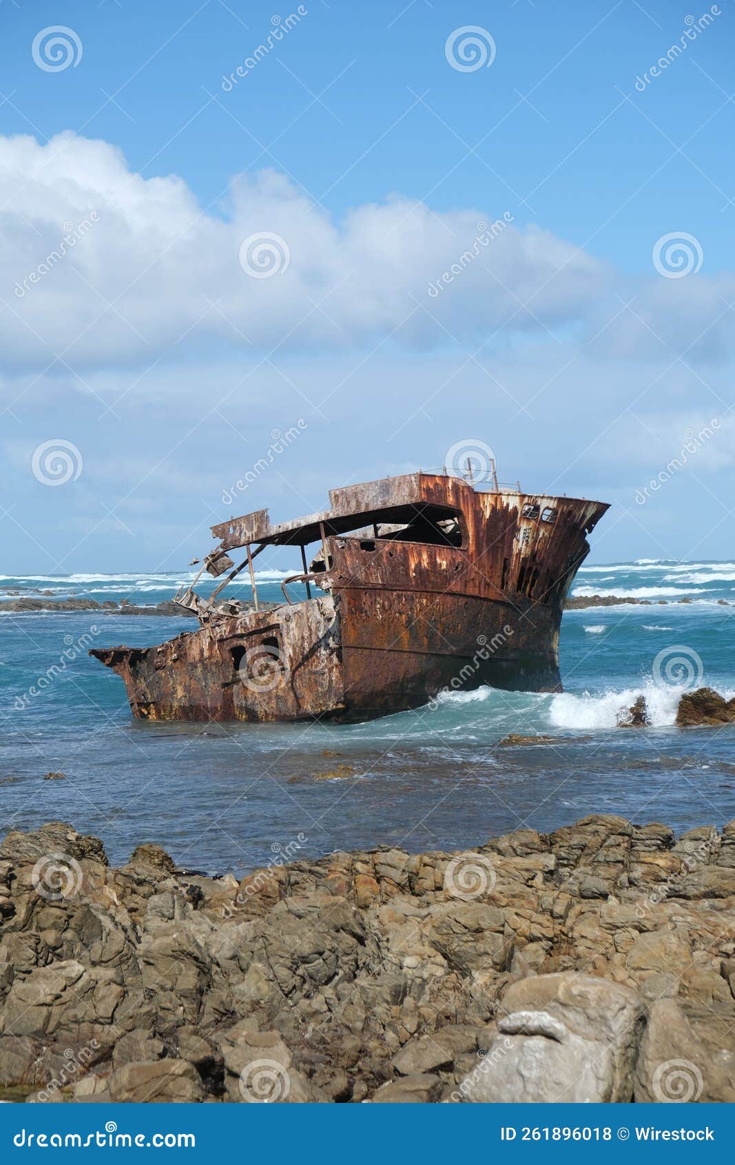 Vertical of a Shipwreck in Seascape Coastline Hulk of a Cargo Ship ...