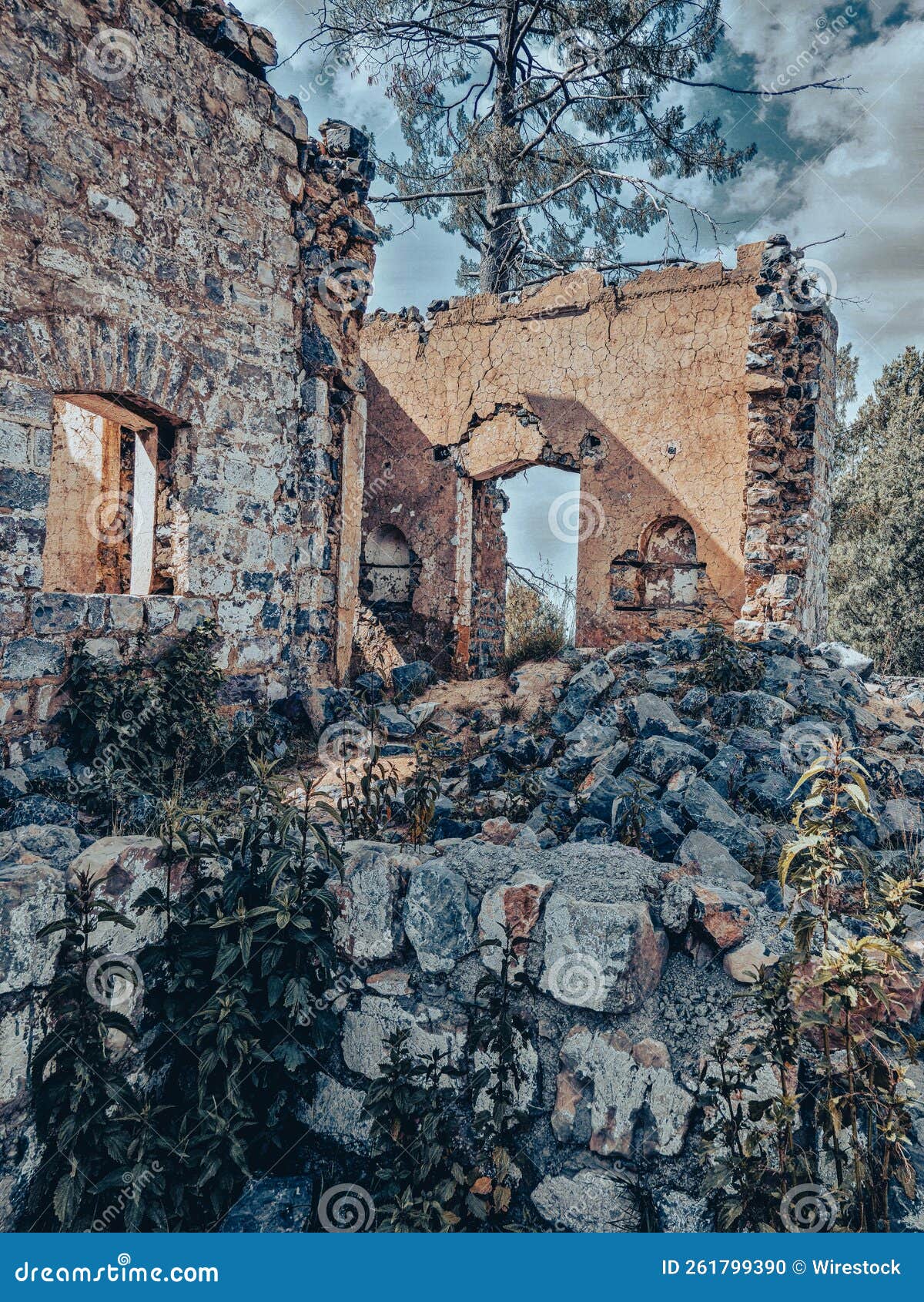 Vertical Shot of an Abandoned Damaged Stone Hut Stock Photo - Image of ...