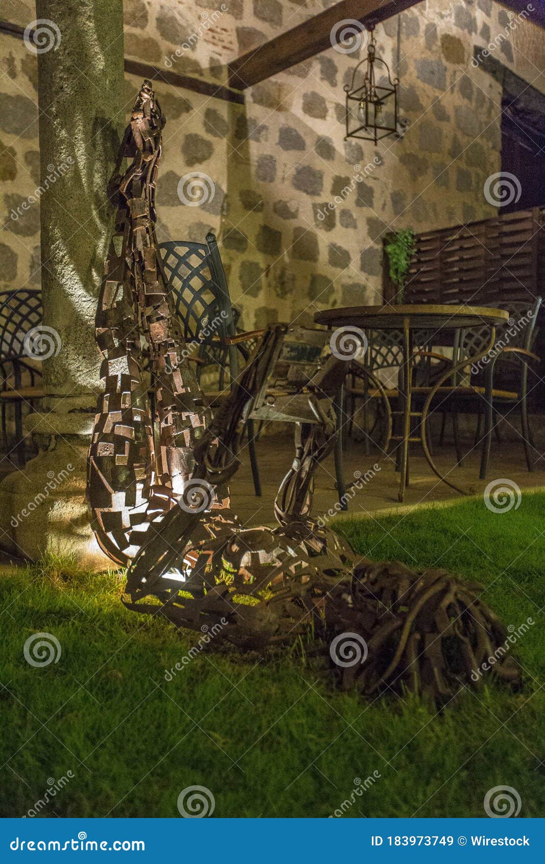 Vertical Shot of an Abstract Metal Sculpture in a Cafe Stock Image ...