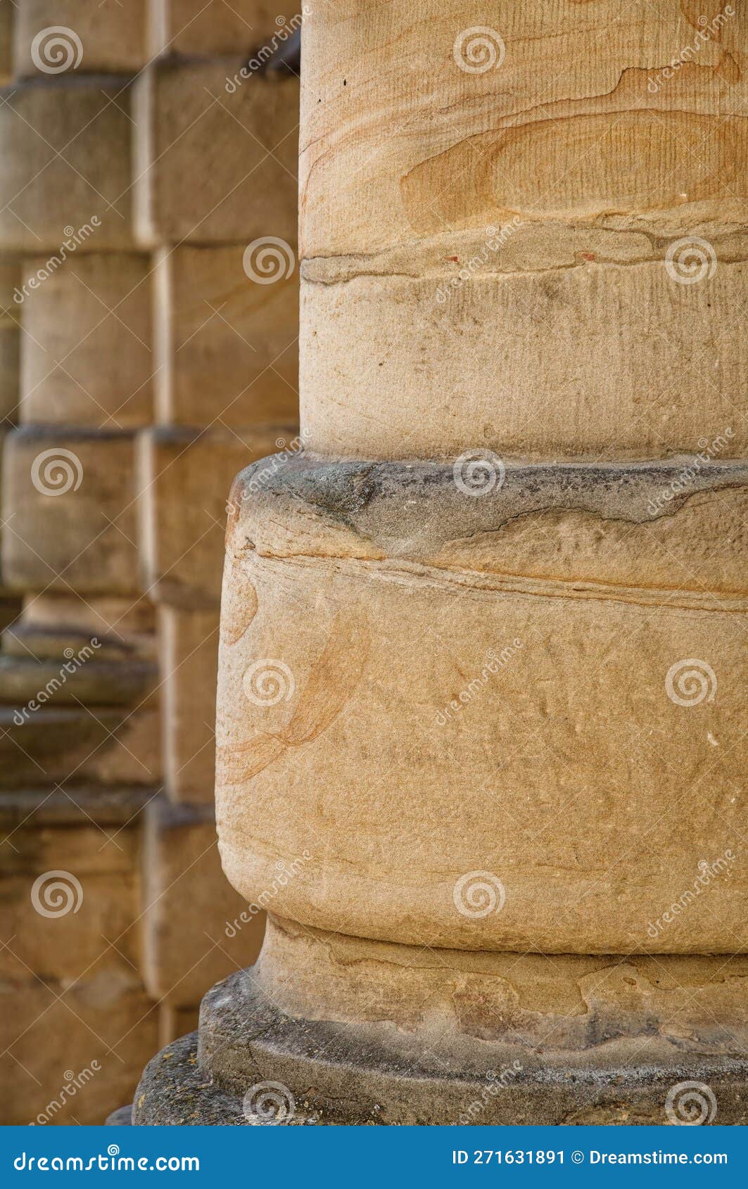 Vertical Shot of Aged Columns Built into the Stone Wall Stock Image ...