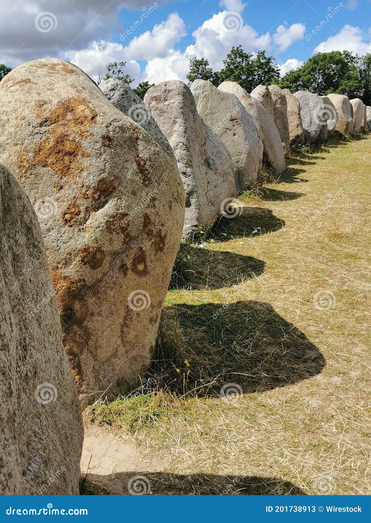 Vertical Shot of Aligned Huge Rocks with Shadows on the Ground Stock ...