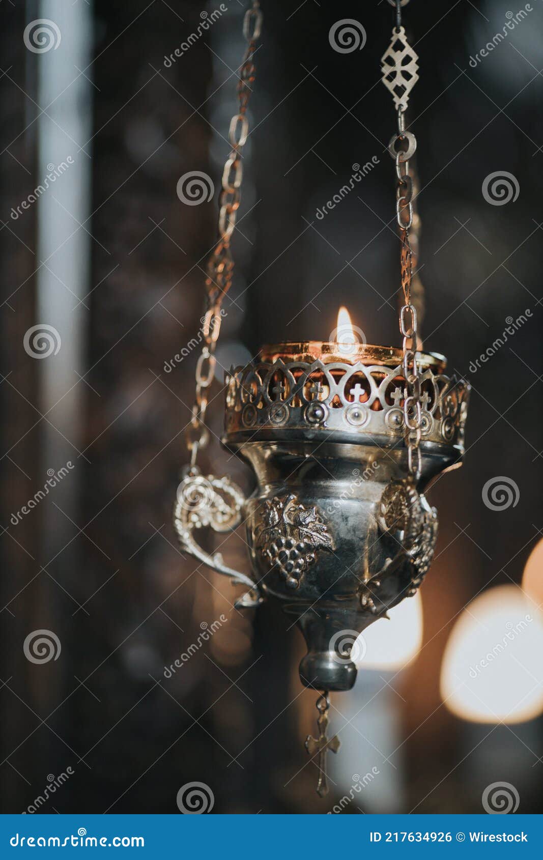 Vertical Shot of an Antique Thurible with Fire Captured Inside a Church ...