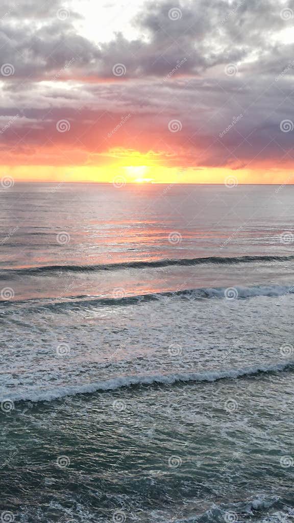 Vertical Shot of the Beach at Sunset Stock Photo - Image of vertical ...