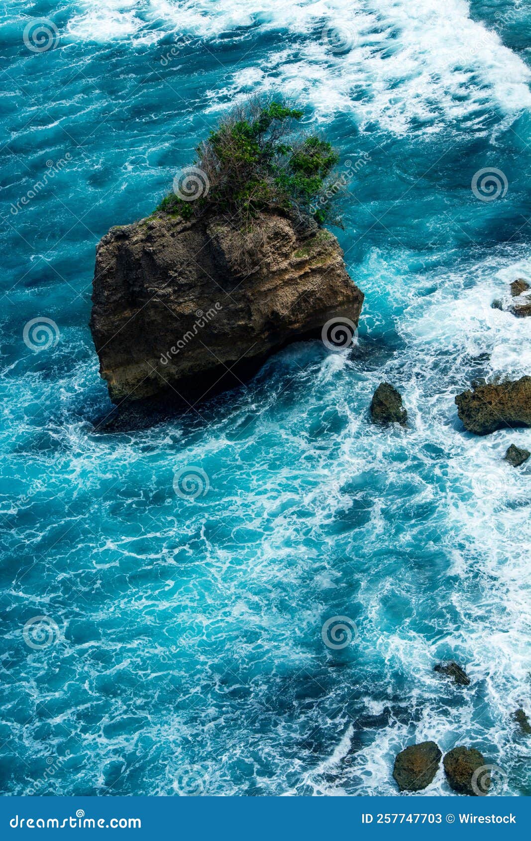 Vertical Shot of the Beach Waves and Rocks in the Island Stock Image ... Vertical Shot of the Beach Waves and Rocks in the Island Stock Image ...