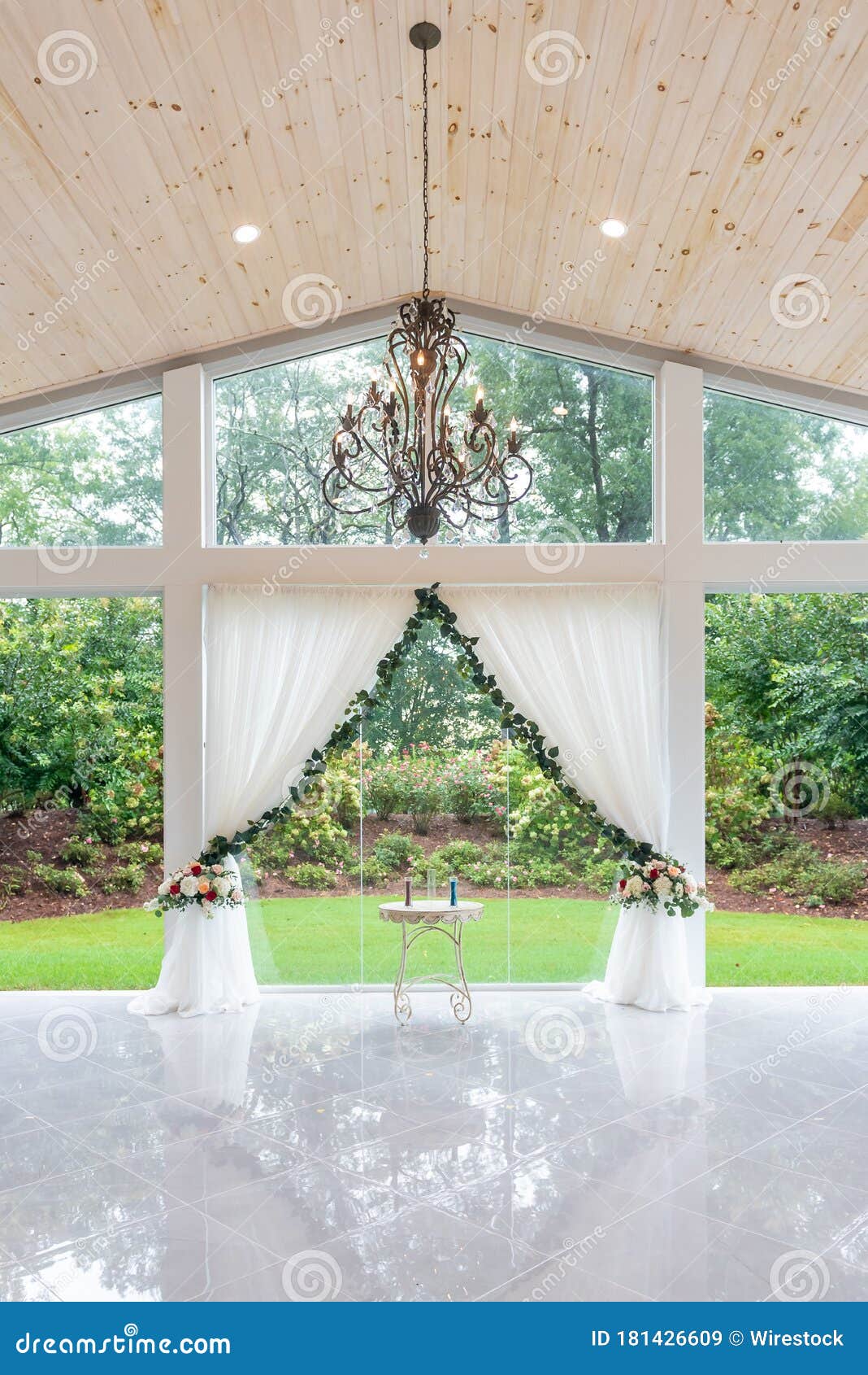 Vertical Shot of the Beautiful Altar Decorated with White Curtains in a ...