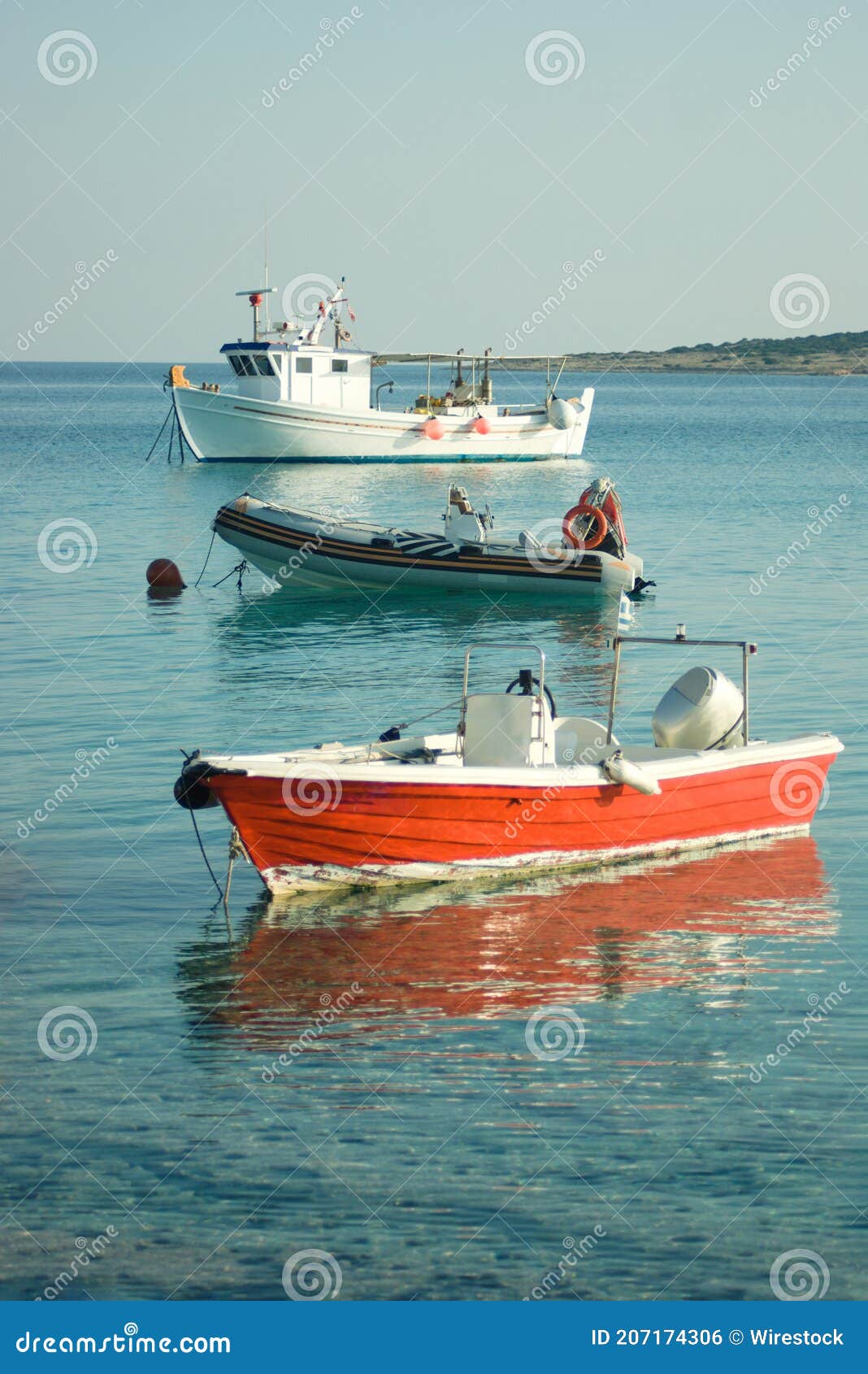 Vertical Shot of Beautiful Boats Floating in the Water Stock Photo ...