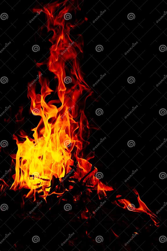 Vertical Shot of a Beautiful Burning Fire at Night Stock Photo - Image ...