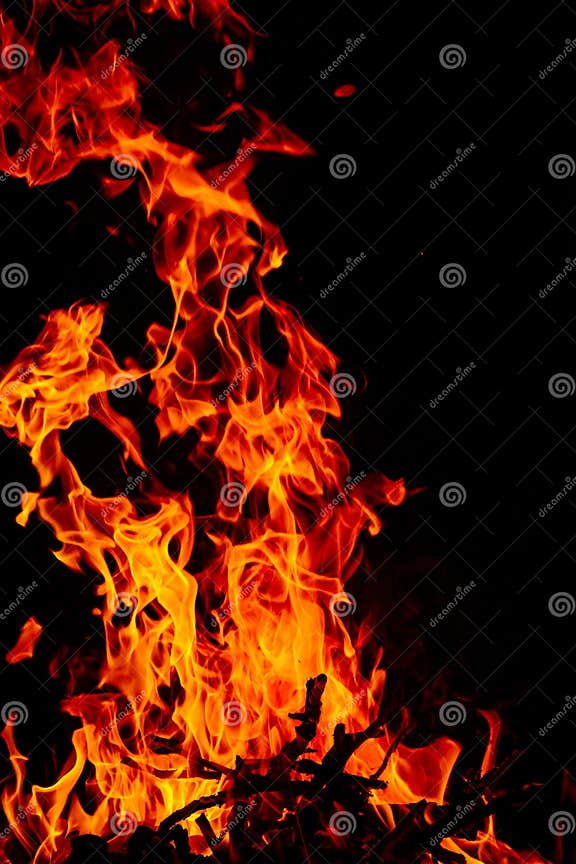 Vertical Shot of a Beautiful Burning Fire at Night Stock Photo - Image ...
