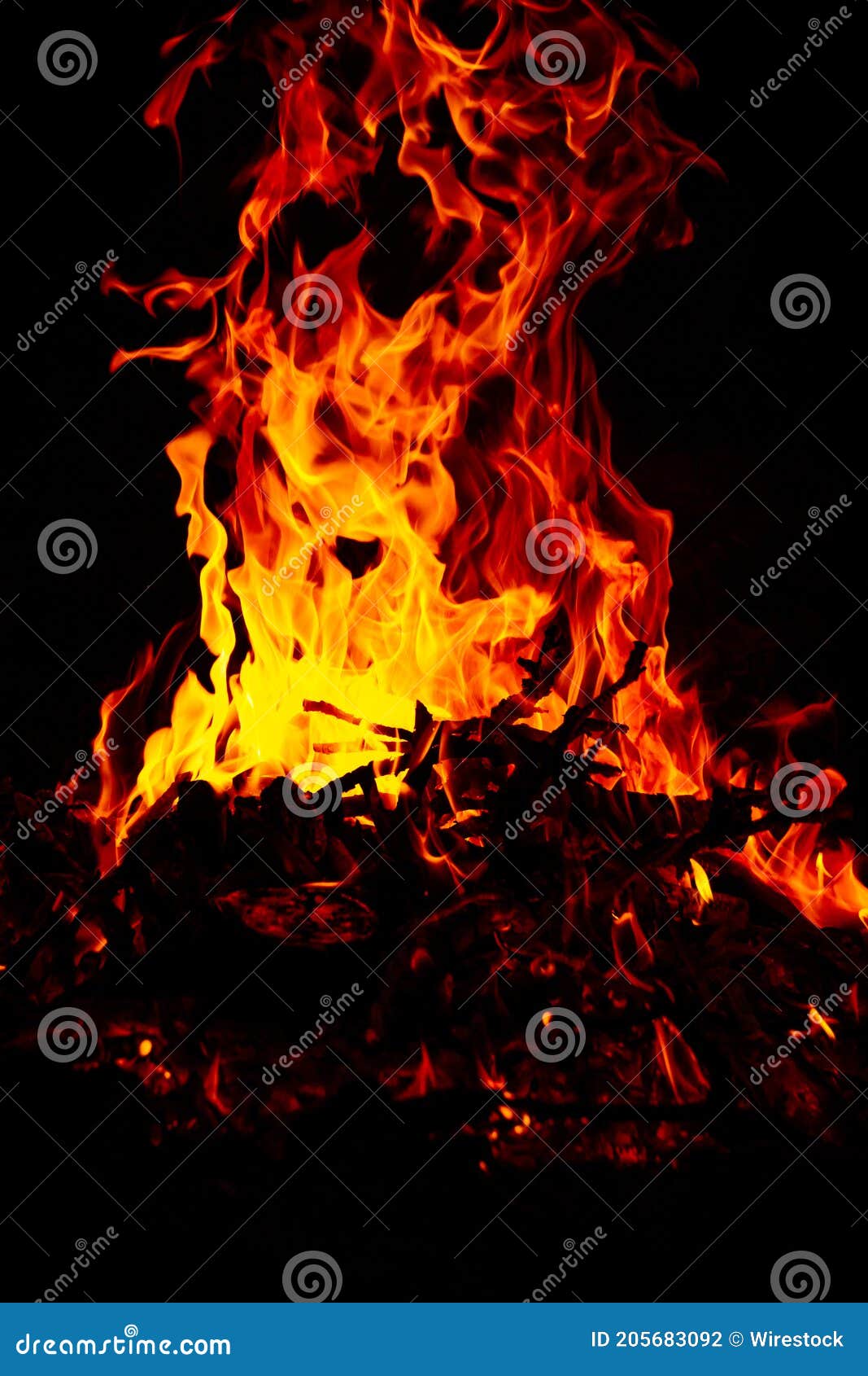 Vertical Shot of a Beautiful Burning Fire at Night Stock Photo - Image ...