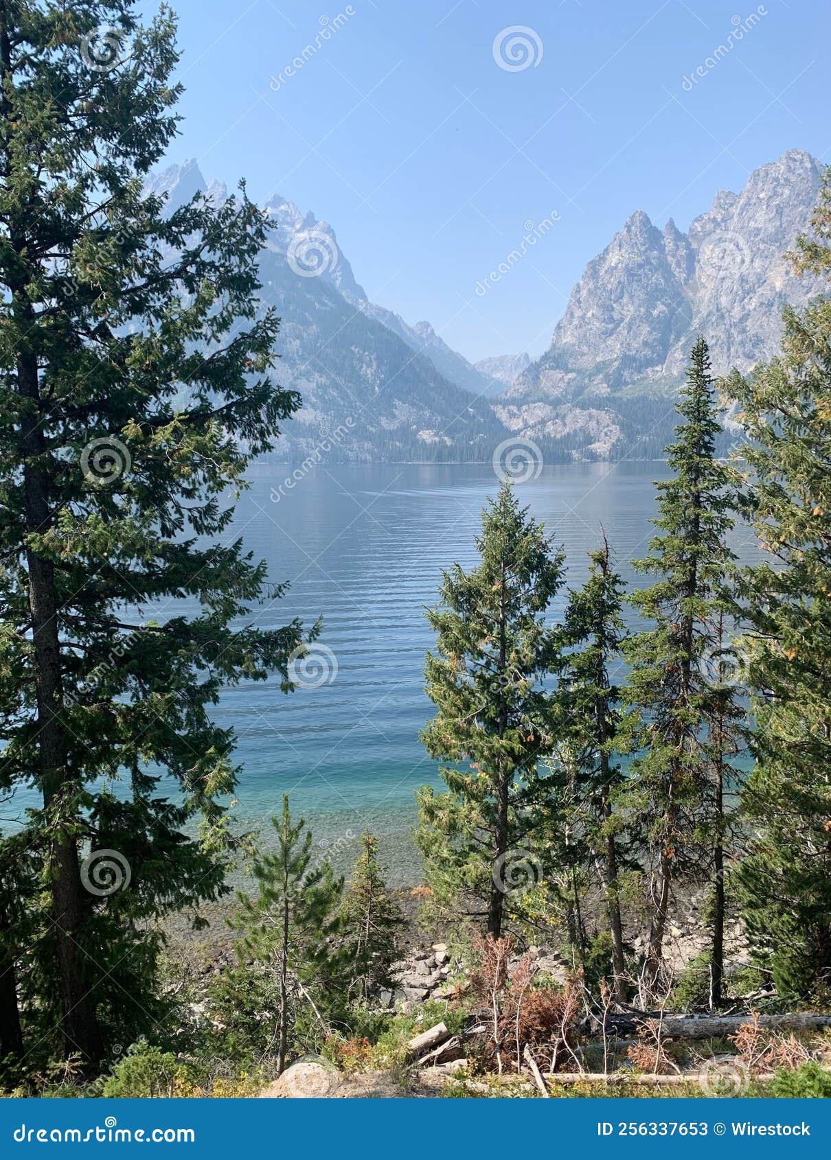 Vertical Shot of a Beautiful Scenery with a Clear Lake, Mountains and ...