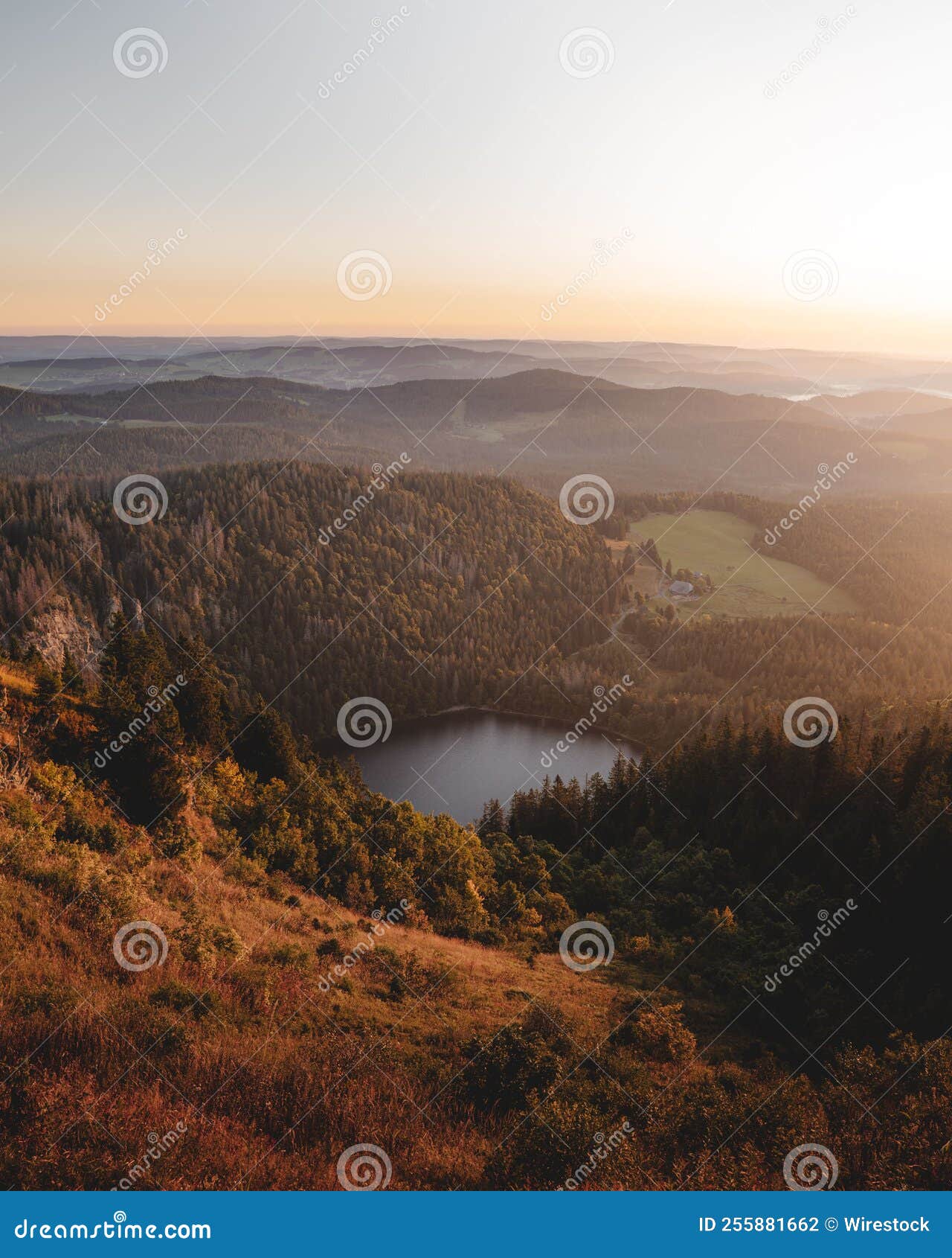 Vertical Shot of a Beautiful Scenery of a Small Lake in the Mountains ...