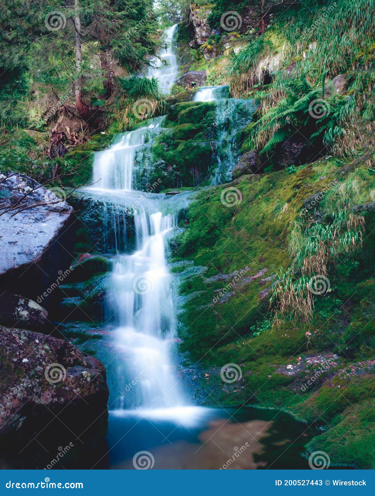 Vertical Shot of a Beautiful Waterfall at Daytime Stock Image - Image ...