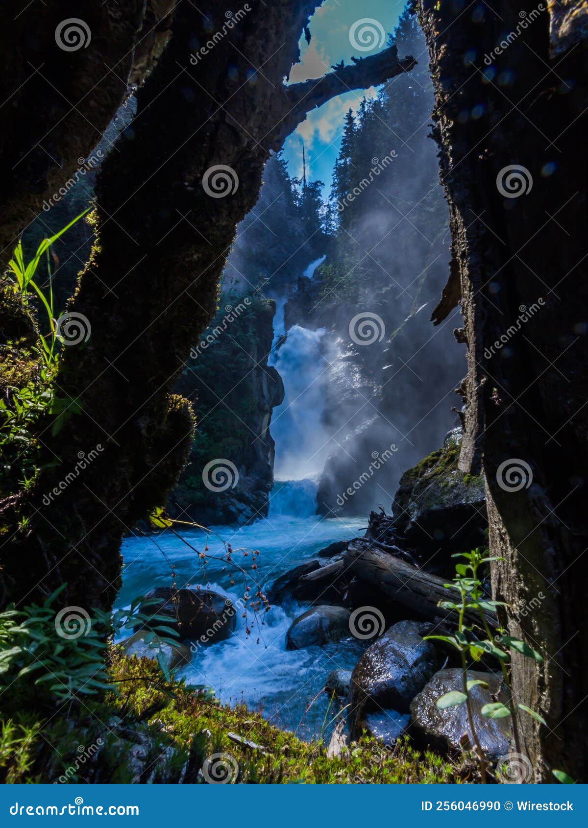 Vertical Shot of a Beautiful Waterfall Flowing through the Cliffs Stock ...