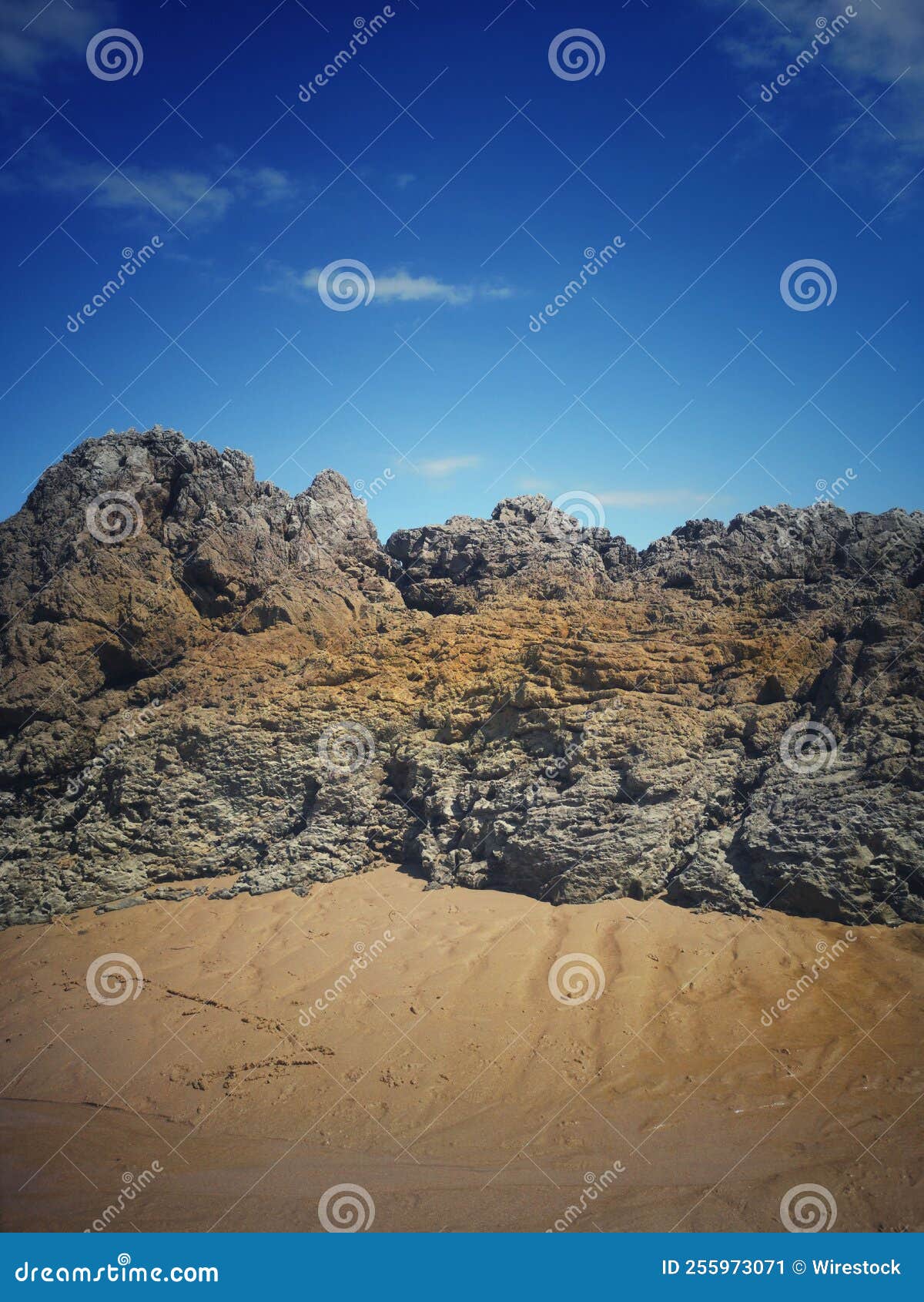 Vertical Shot of a Big Rock on the Sand Stock Image - Image of closeup ...