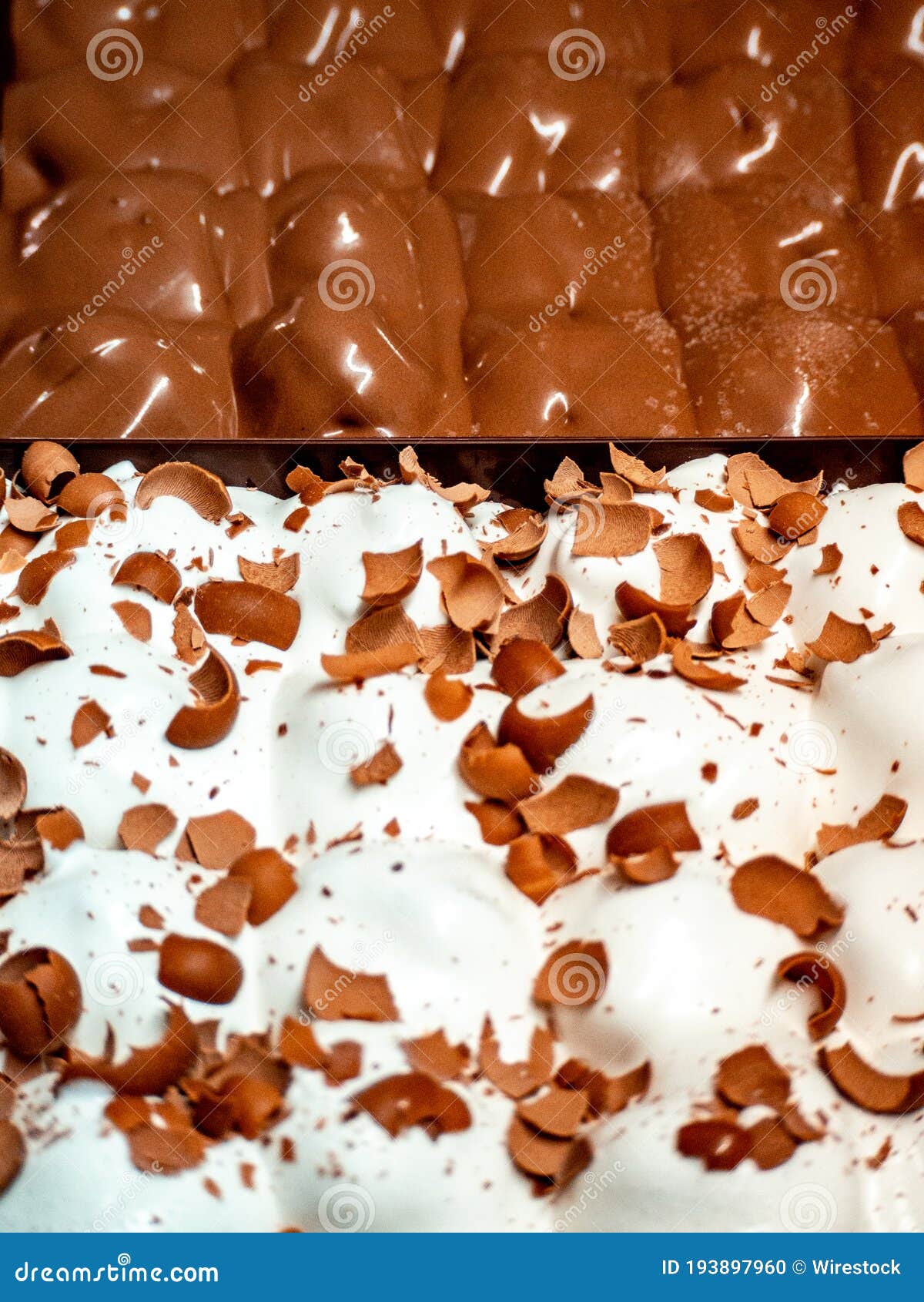 Vertical Shot of Bindi Cake with White Profiteroles Stock Photo - Image ...