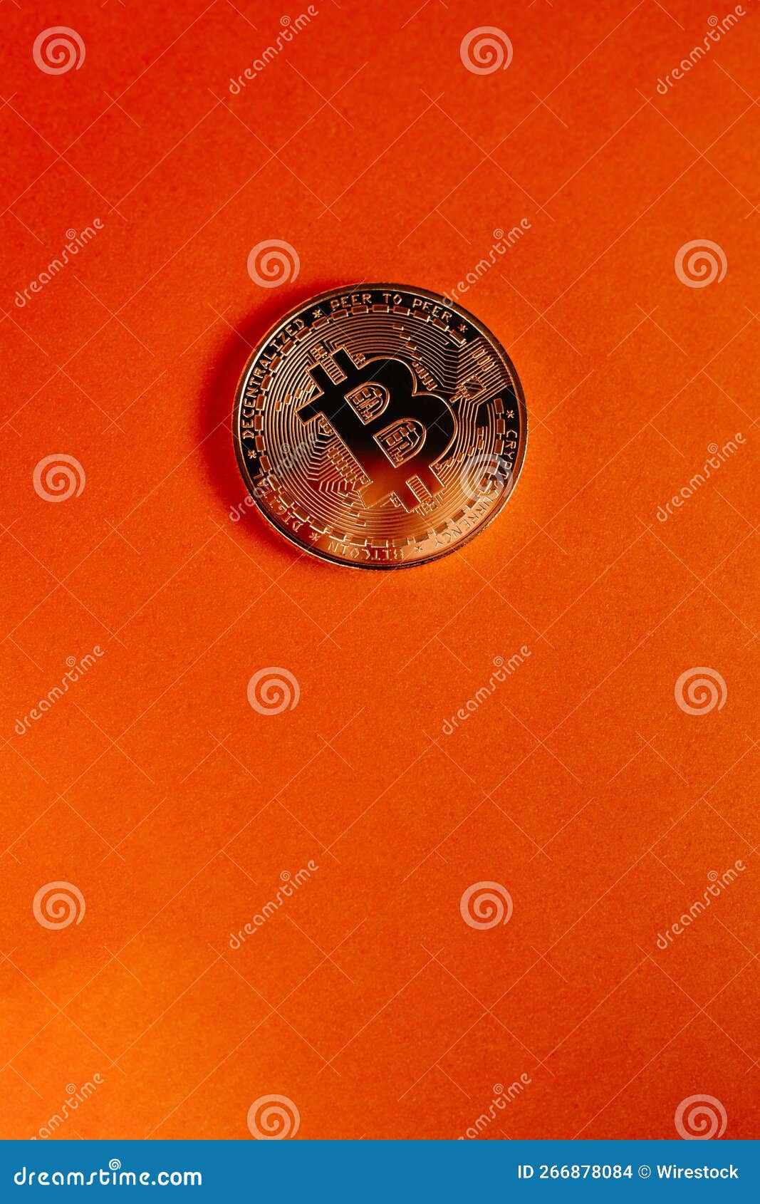 Vertical Shot of a Bitcoin Isolated on an Orange Gradient Background ...