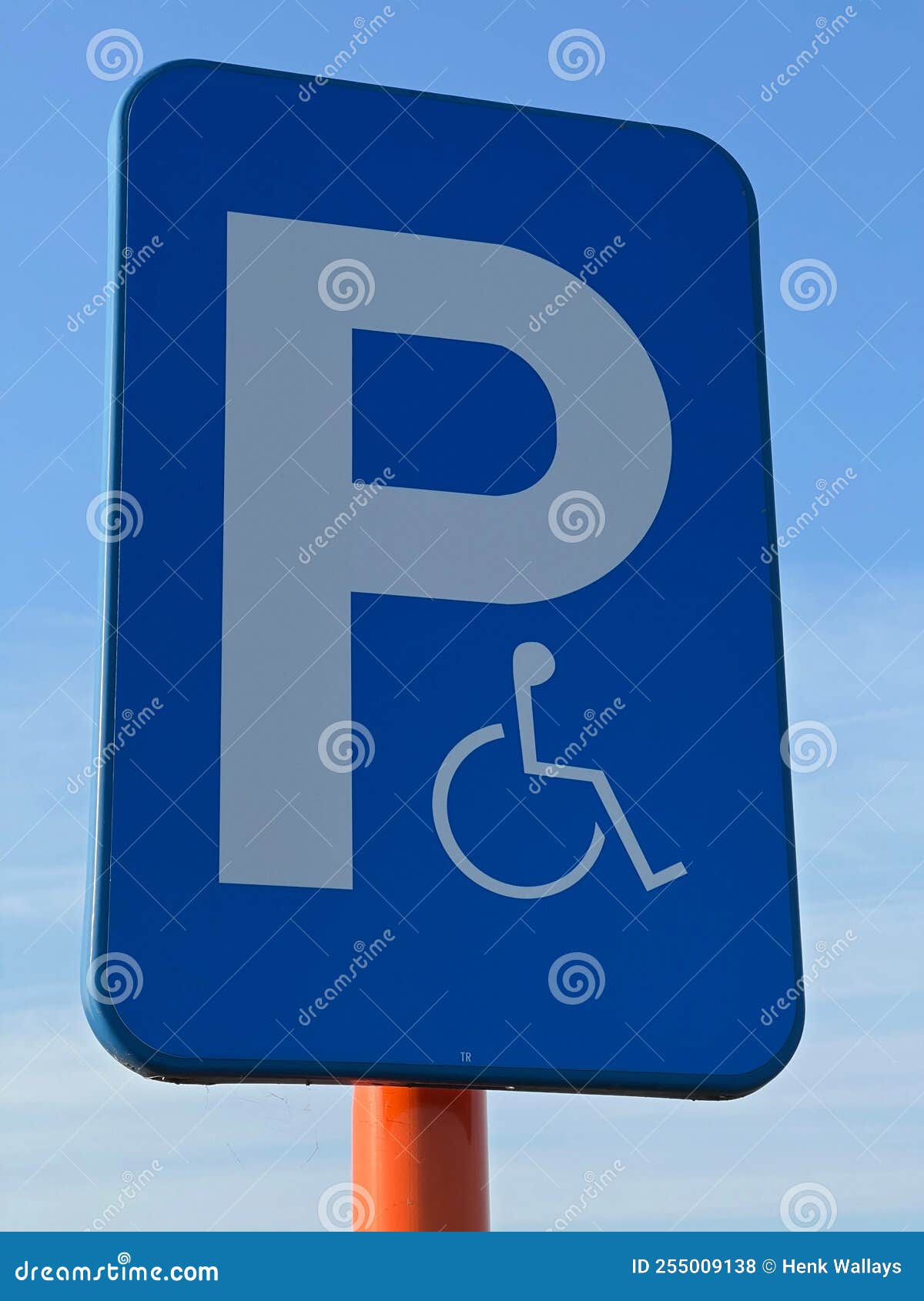 Vertical Shot on a Blue Panel for Reserved Parking Spots for Disabled ...