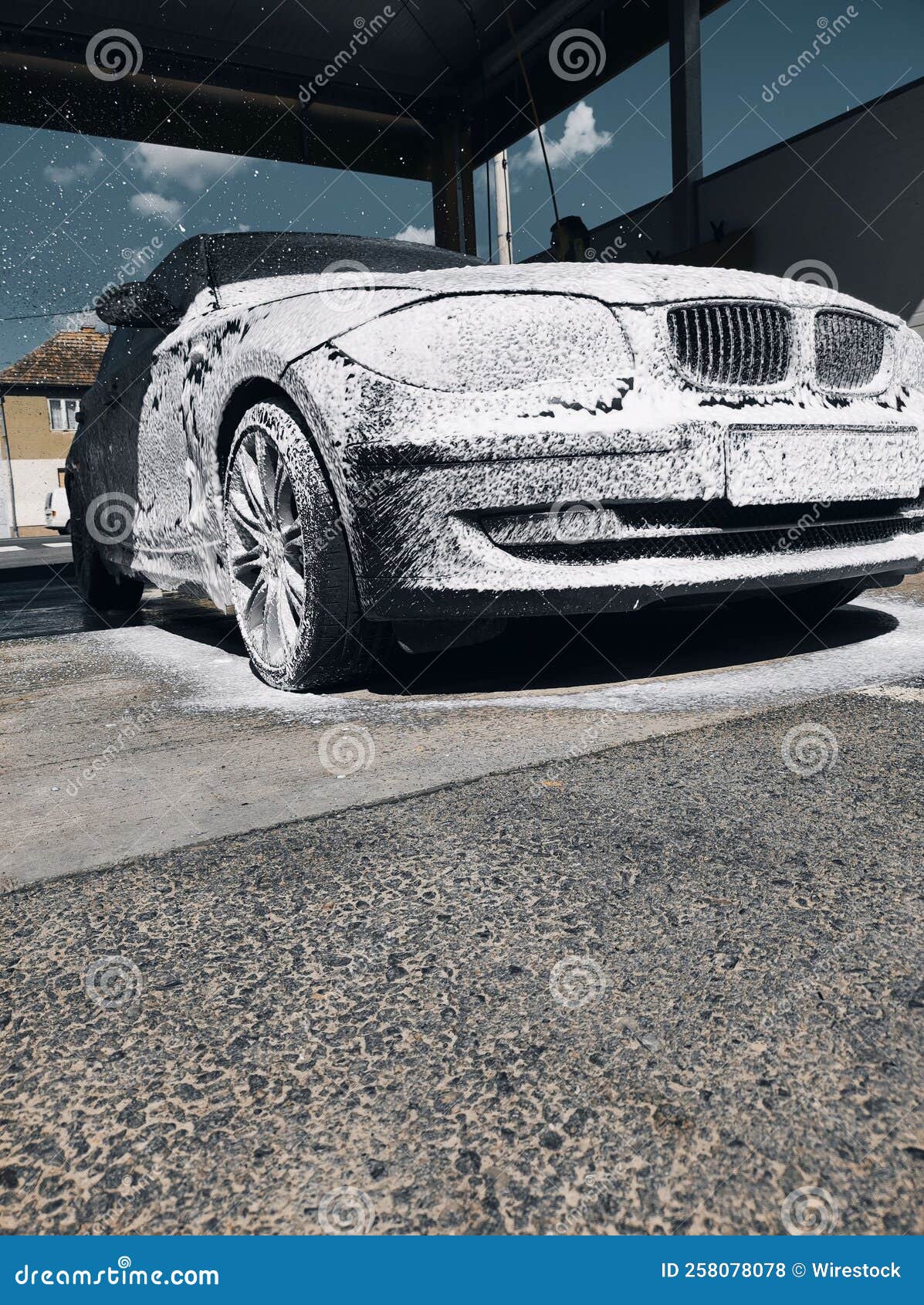 Vertical Shot of the BMW Car Washing Process Stock Photo - Image of ...