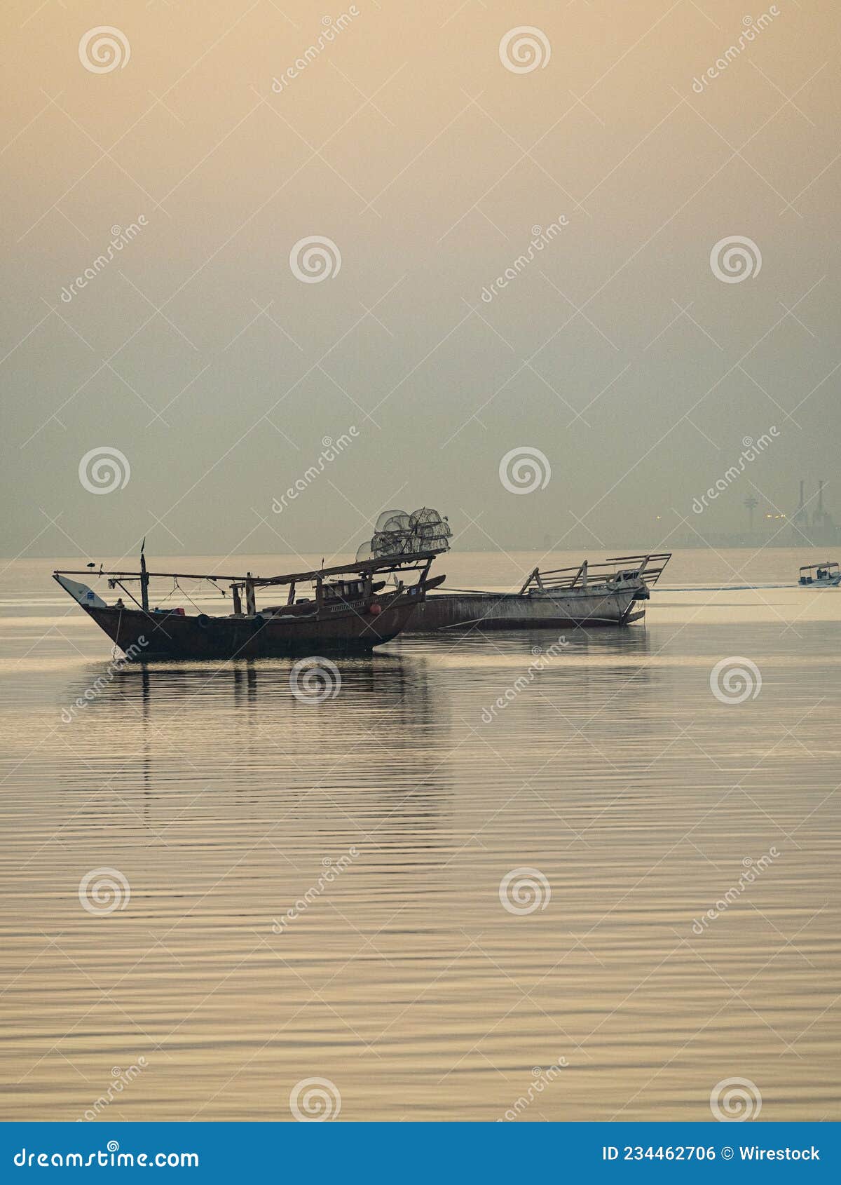 Vertical Shot of Boats on the Sea, during a Calm Evening Stock Photo ...
