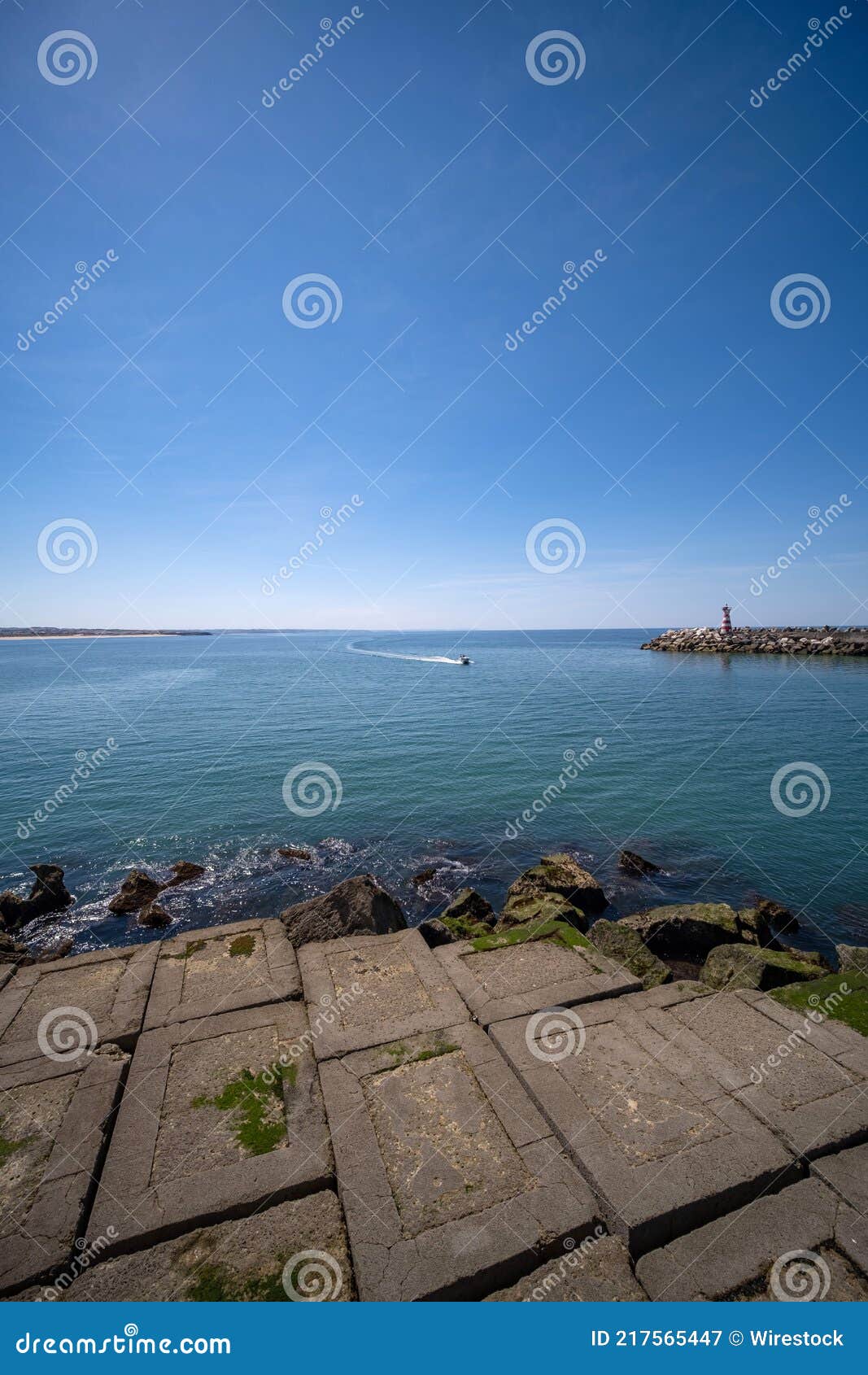 Vertical Shot of Breakwall and Immense Rock Formations on Coastline ...