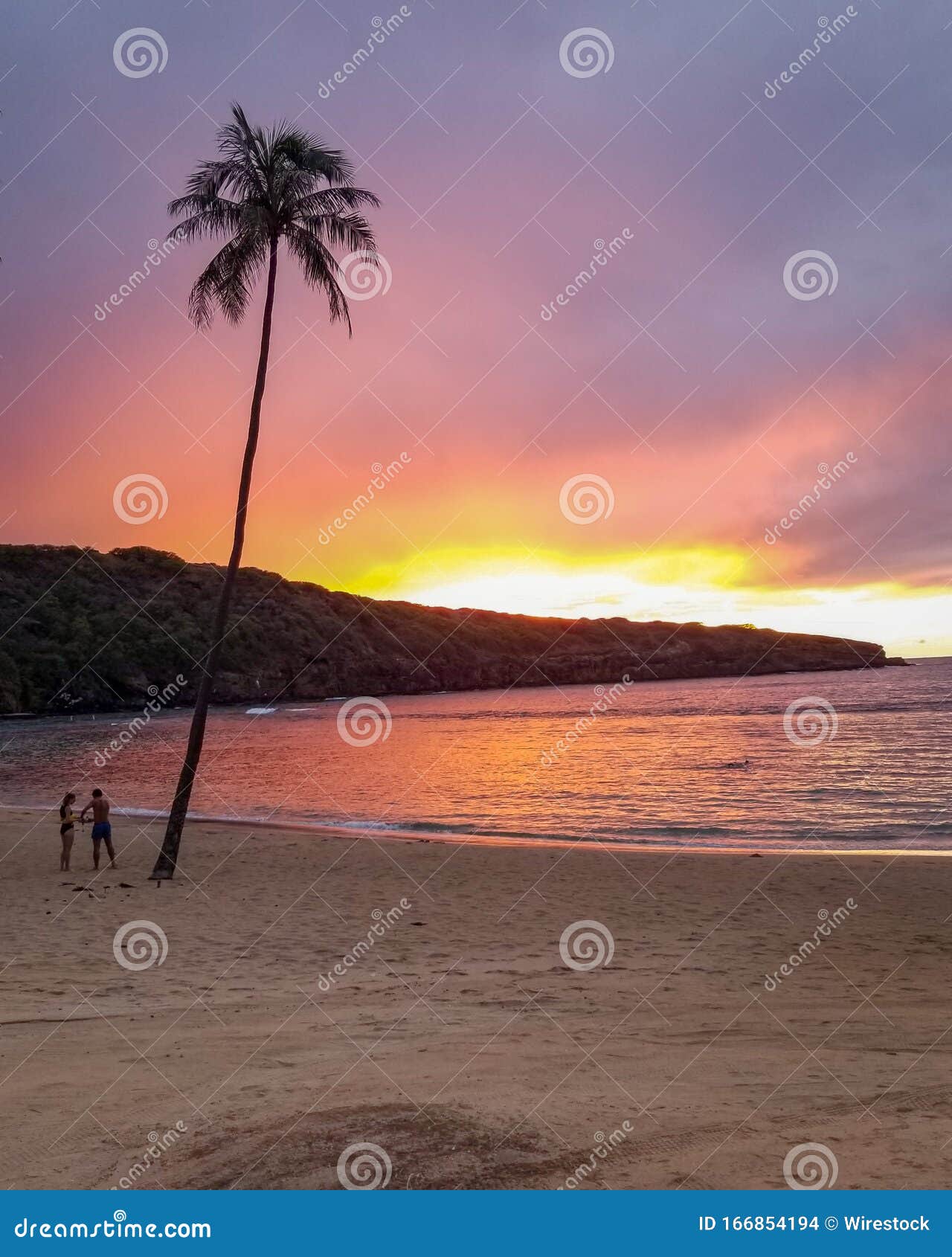 Vertical Shot of a Breathtaking Sunset Over the Ocean at the Tropical ...