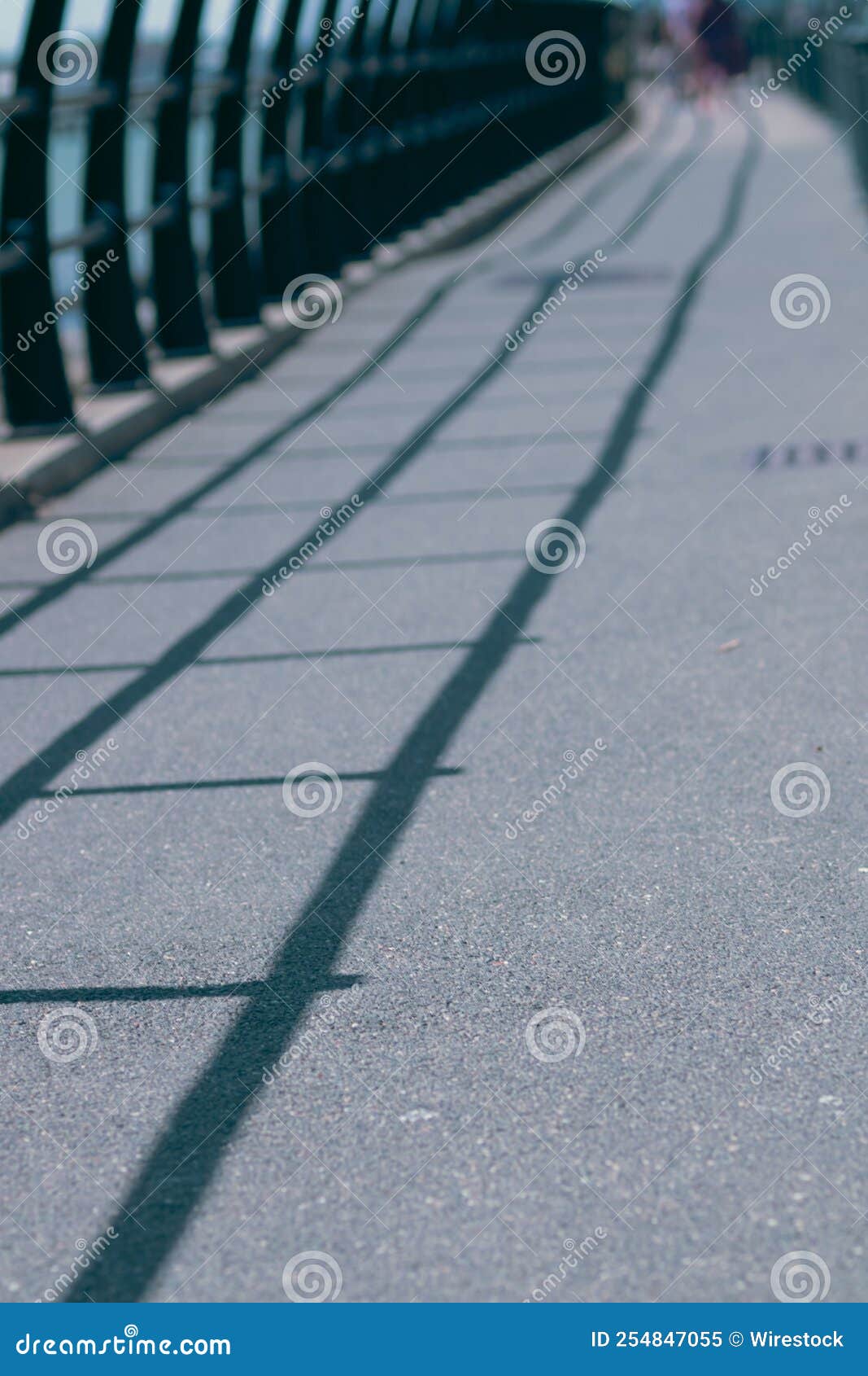 Vertical Shot of the Bridge Deck with the Shadow of the Railing ...