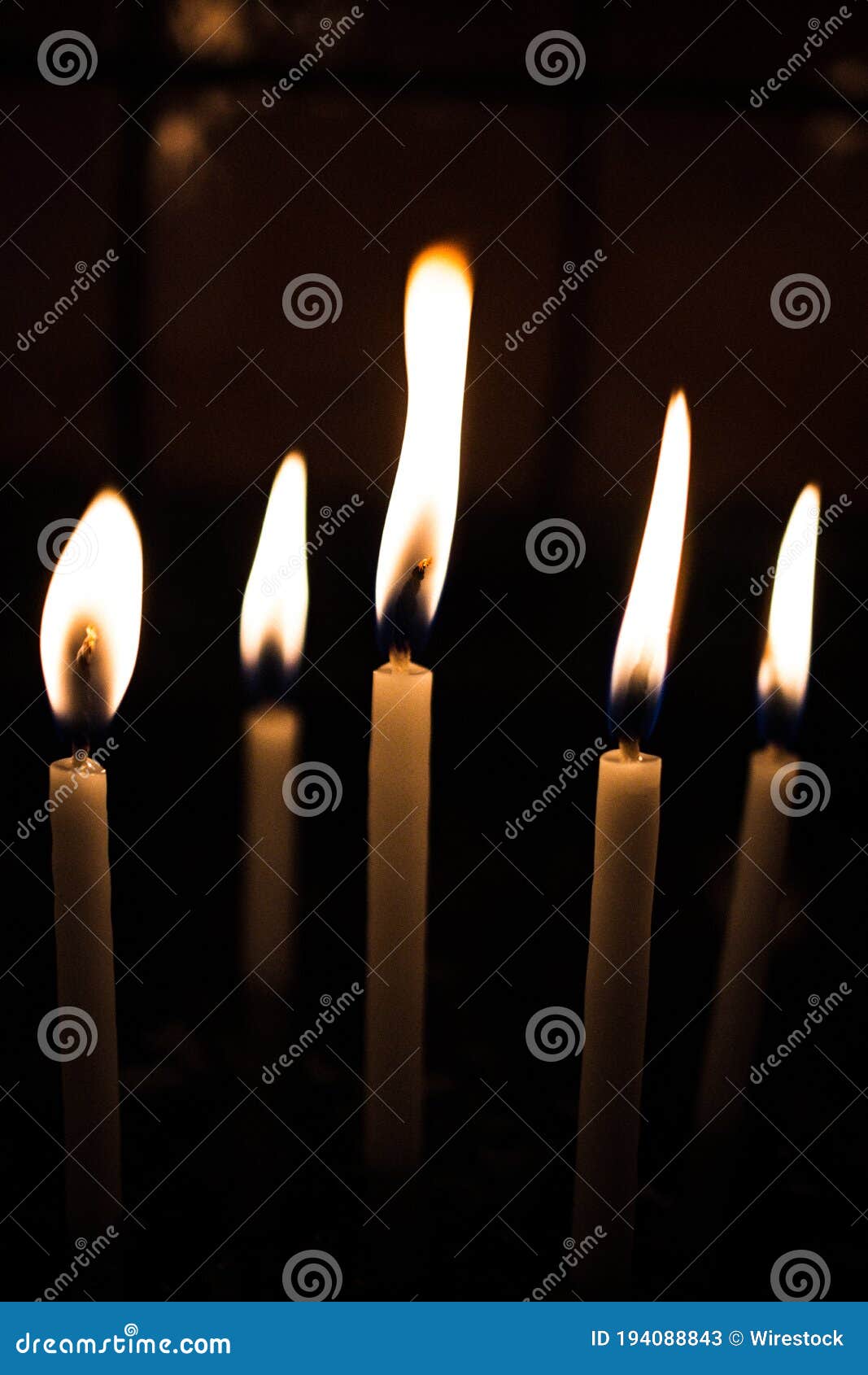 Vertical Shot of Burning Candles in the Darkness Stock Image - Image of ...