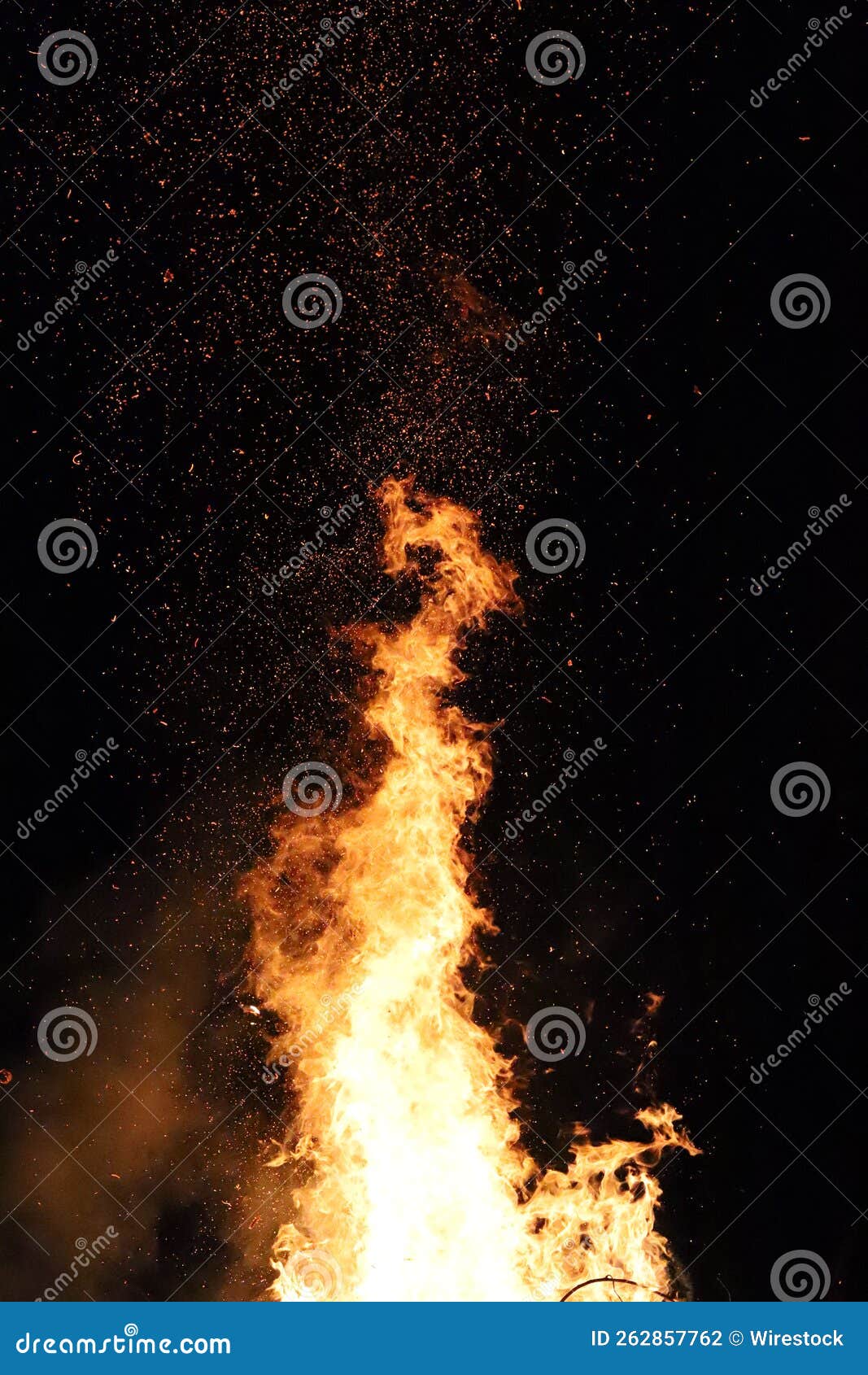 Vertical Shot of a Burning Fire with Sparkling Flames at Night Stock ...