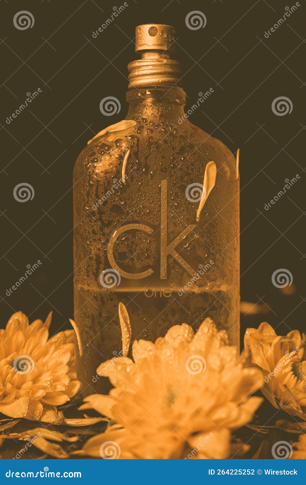 Vertical Shot of the Calvin Klein One Perfume with Flower Decorations ...