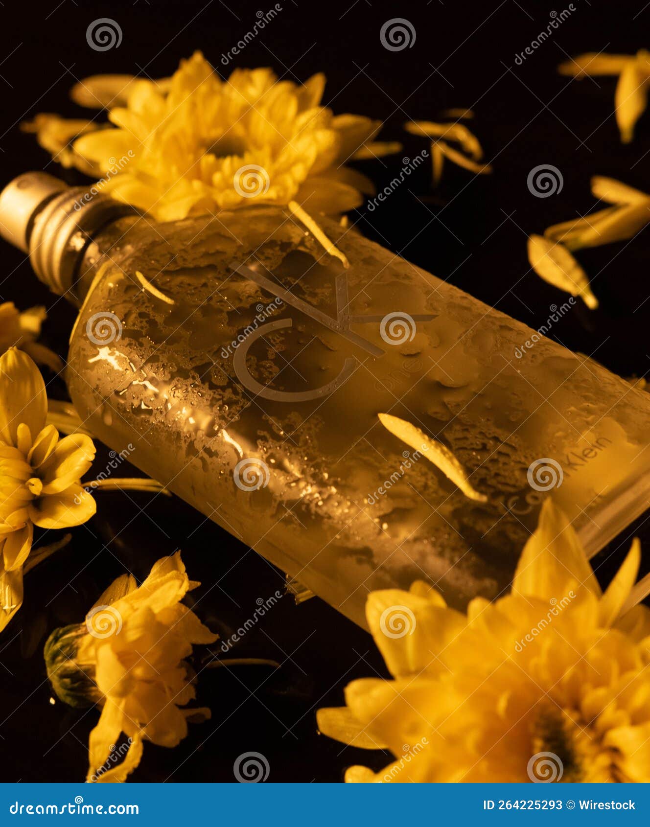Vertical Shot of the Calvin Klein One Perfume with Flower Decorations ...