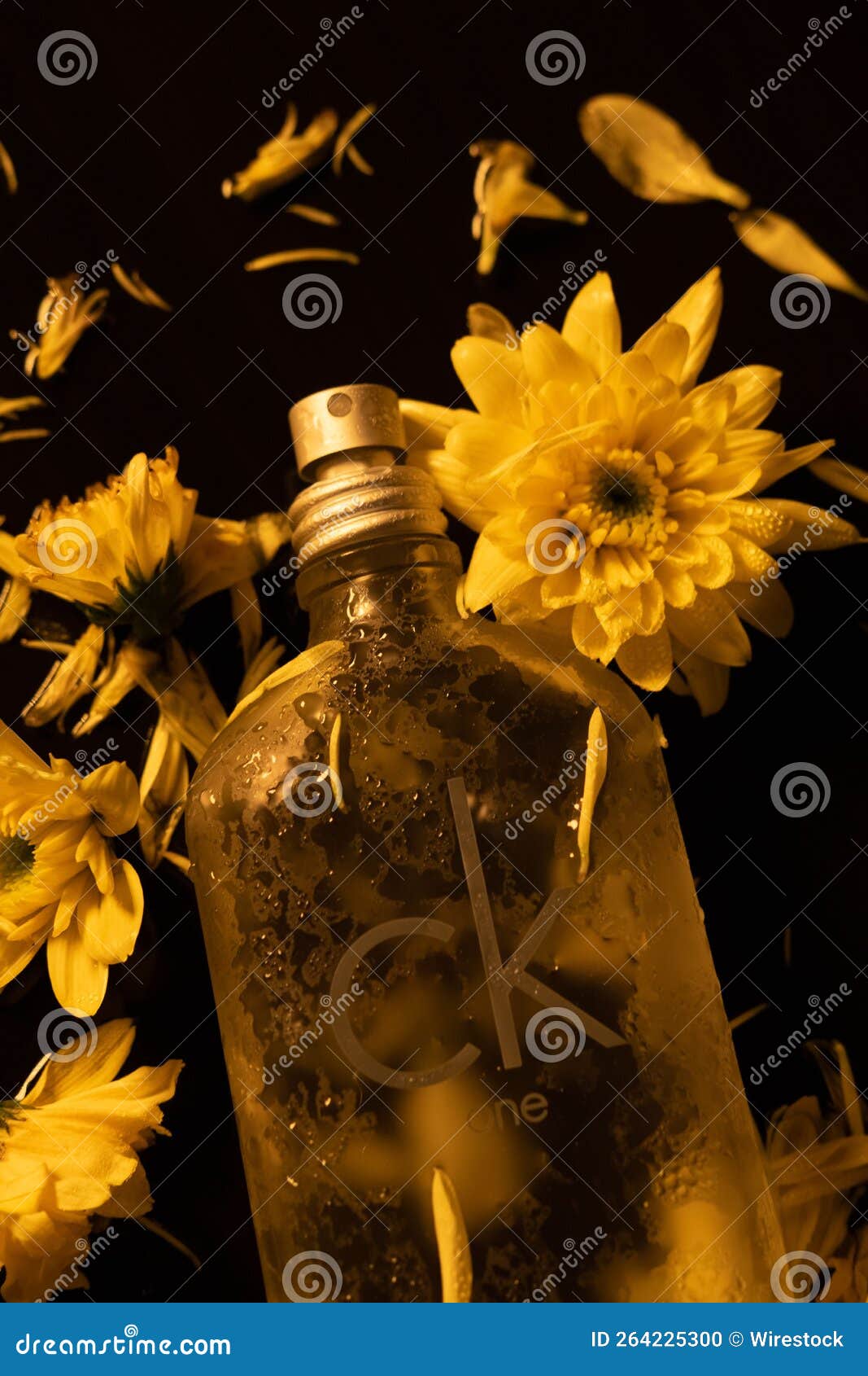 Vertical Shot of the Calvin Klein One Perfume with Flower Decorations ...