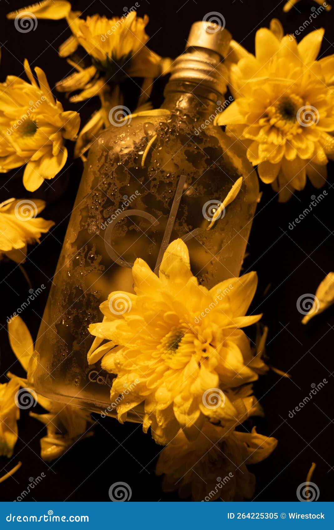 Vertical Shot of the Calvin Klein One Perfume with Flower Decorations ...