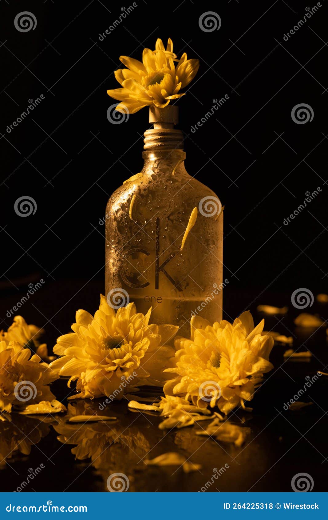 Vertical Shot of the Calvin Klein One Perfume with Flower Decorations ...