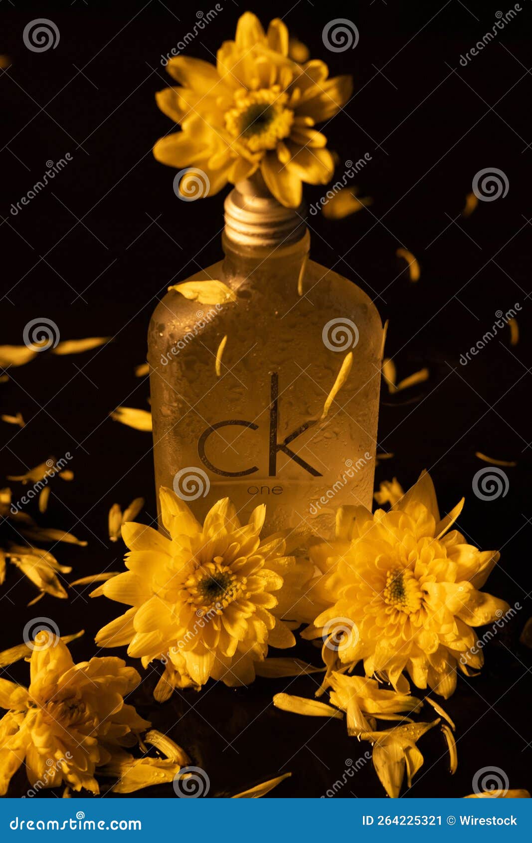 Vertical Shot of the Calvin Klein One Perfume with Flower Decorations ...