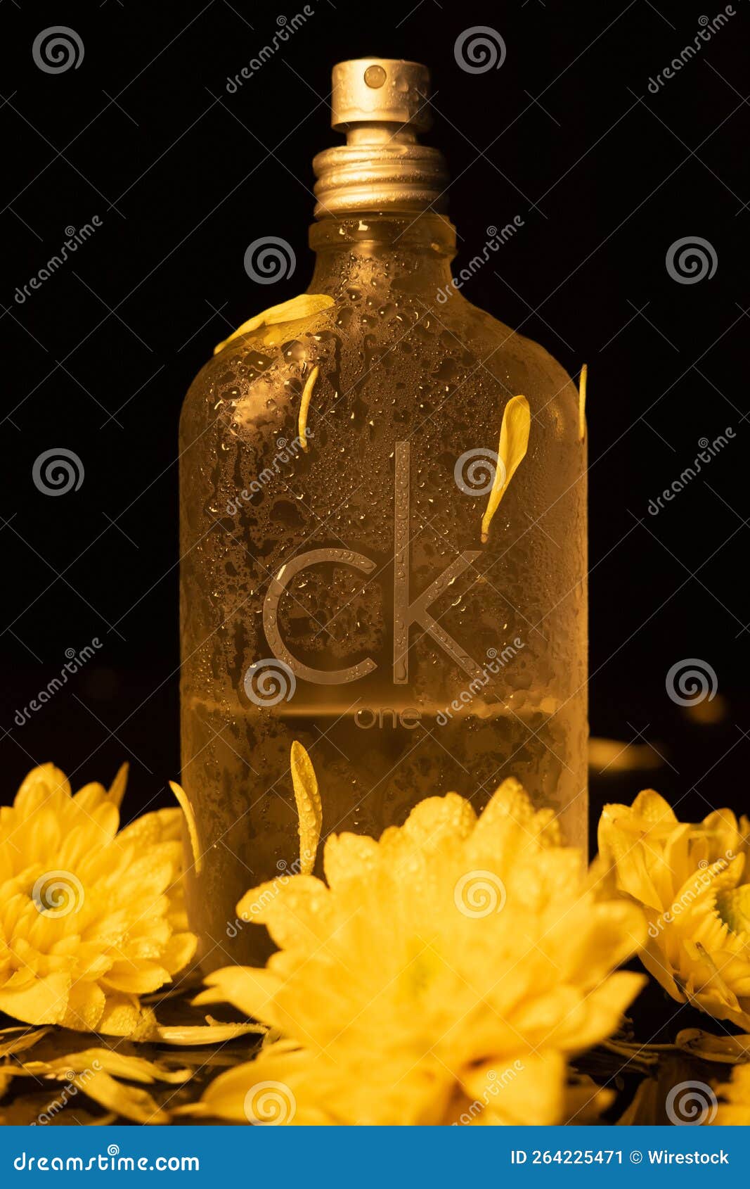Vertical Shot of the Calvin Klein One Perfume with Flower Decorations ...