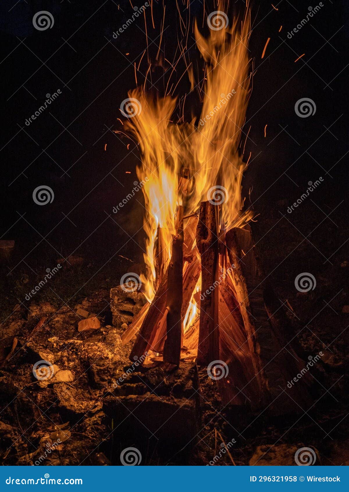 Vertical Shot of a Campfire Burning at Night Stock Photo - Image of ...