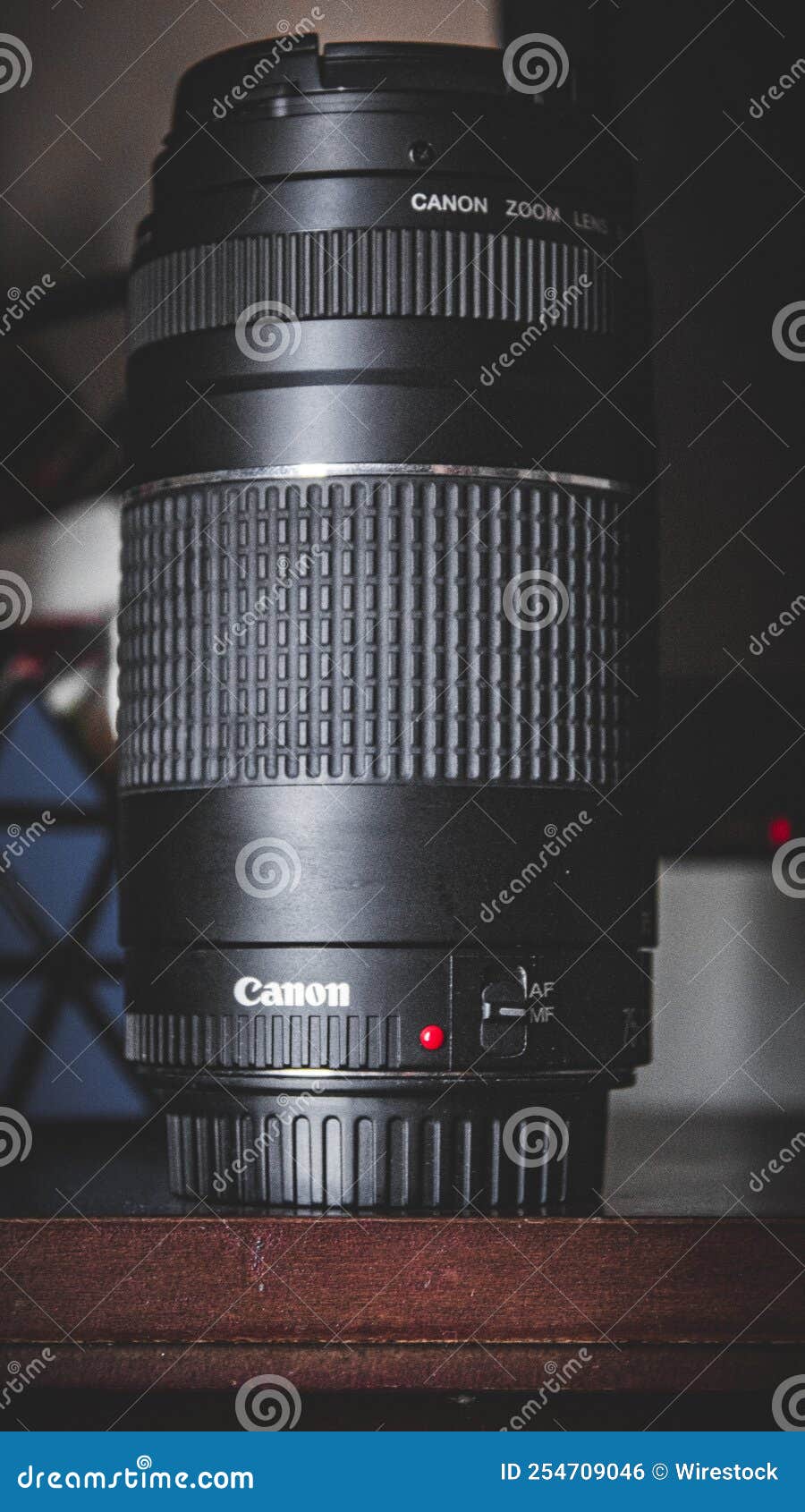 Vertical Shot of a Canon Lens on a Desk Editorial Photo - Image of ...