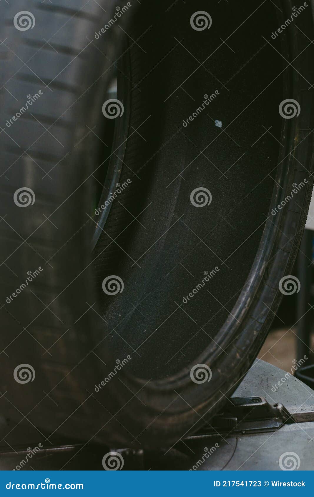 Vertical Shot of a Car Tire without the Rim in a Workshop Stock Image ...