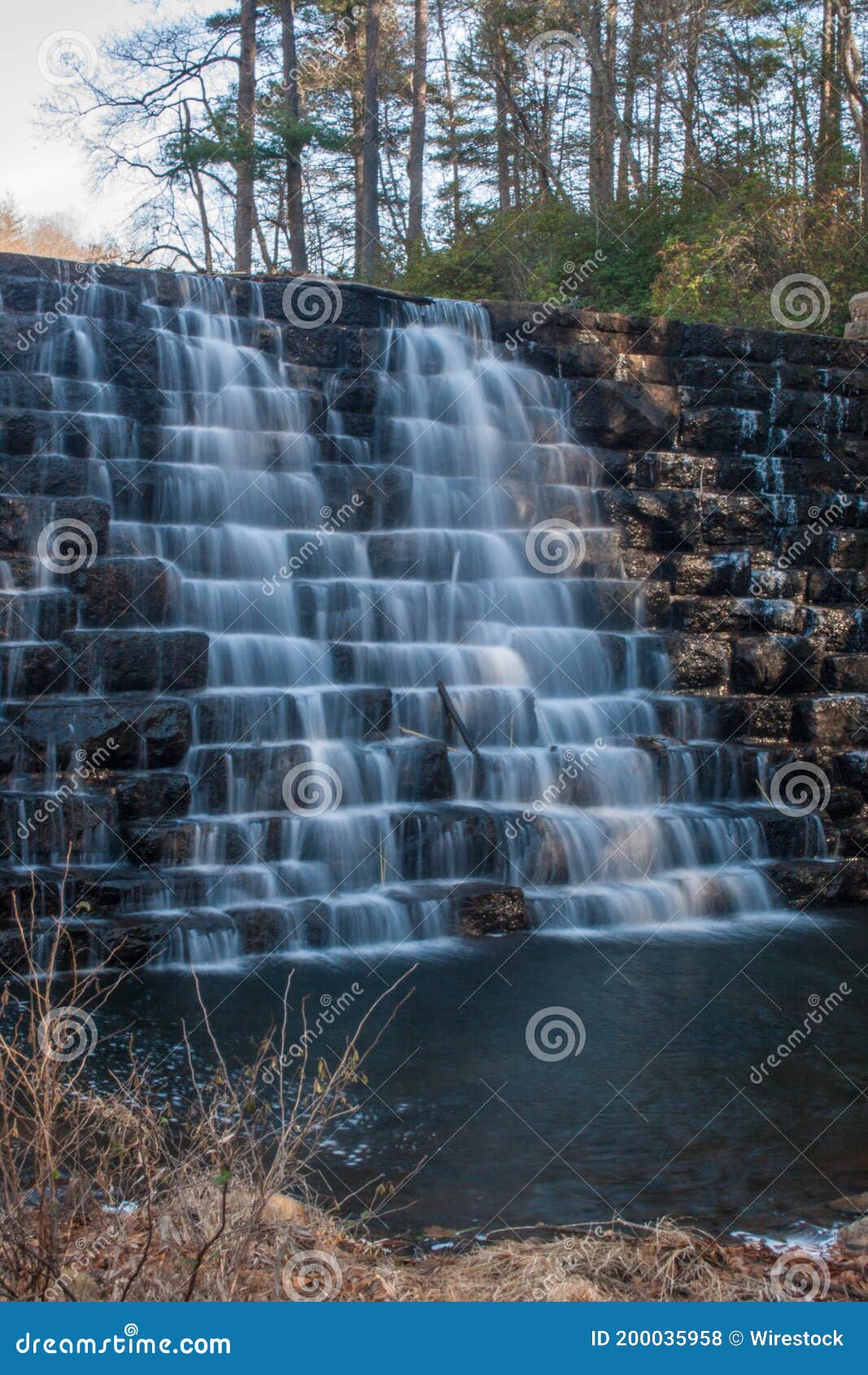 Vertical Shot of a Cascade Layered Waterfall Stock Photo - Image of ...