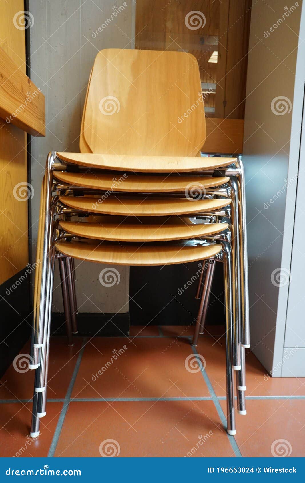 Vertical Shot of Chairs on Top of Each Other Stock Photo - Image of ...