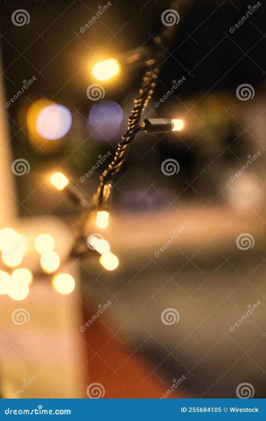Vertical Shot of Christmas Lights Illuminated in the Dark Stock Image ...