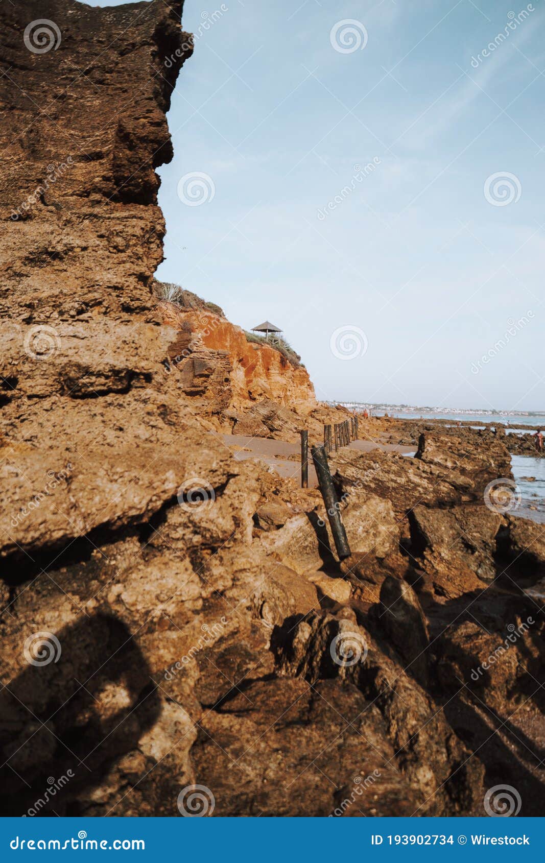 Vertical Shot of Cliffs on the Seaside Stock Photo - Image of ...