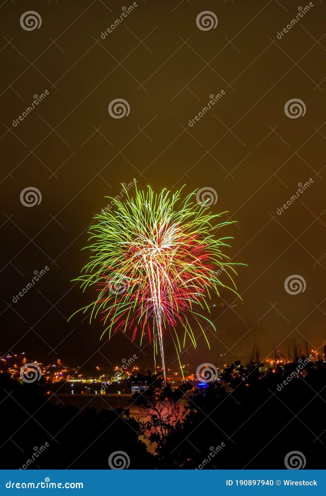 Vertical Shot of Colorful Fireworks in the City at Night Stock Photo ...